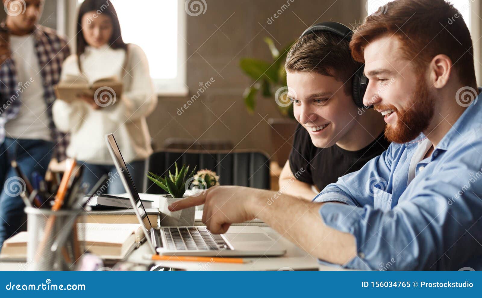 Learning Concept. Students Pointing at Laptop`s Screen Stock Image ...