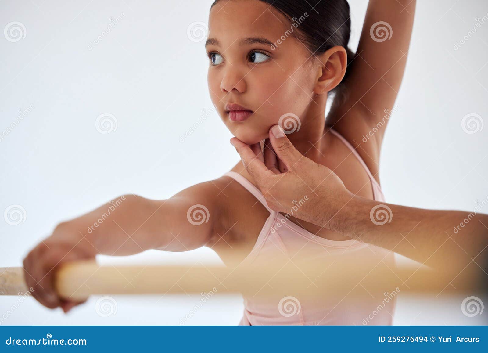 Learning the Correct Stance. Closeup Shot of a Ballet Teacher Assisting ...