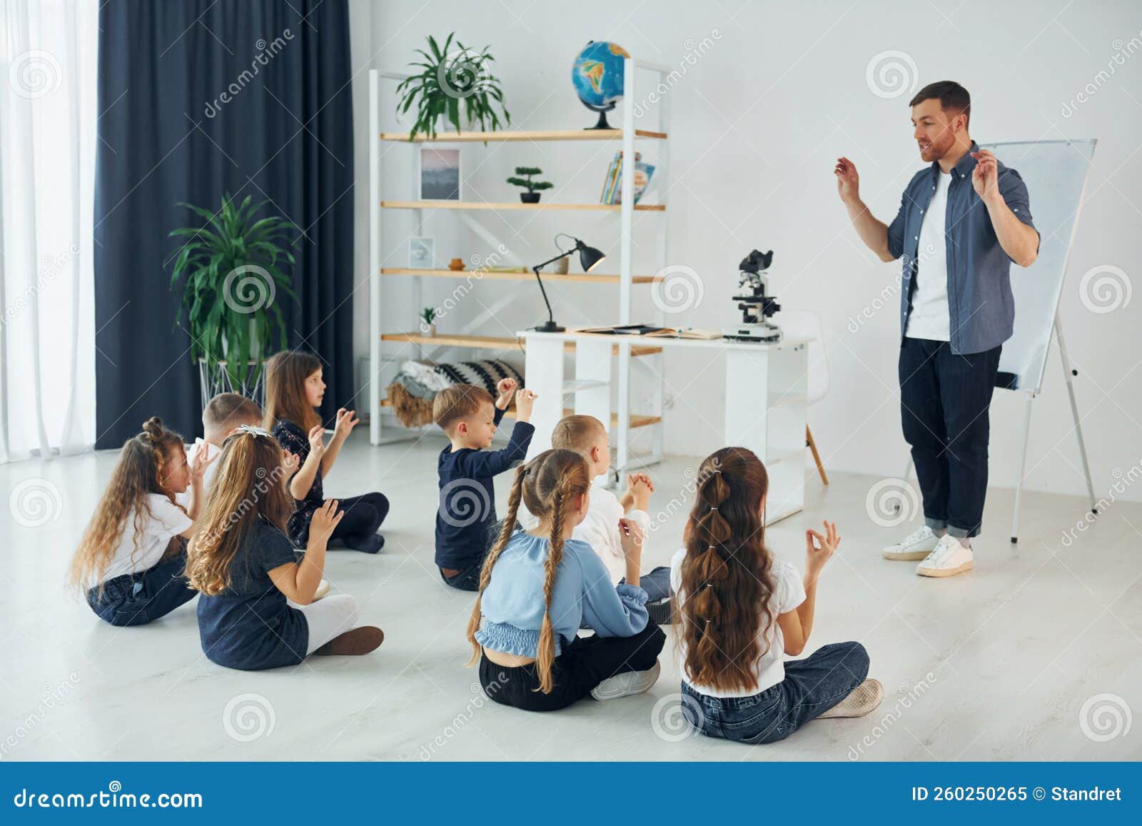 Learning Gesture Language. Group of Children Students in Class at ...