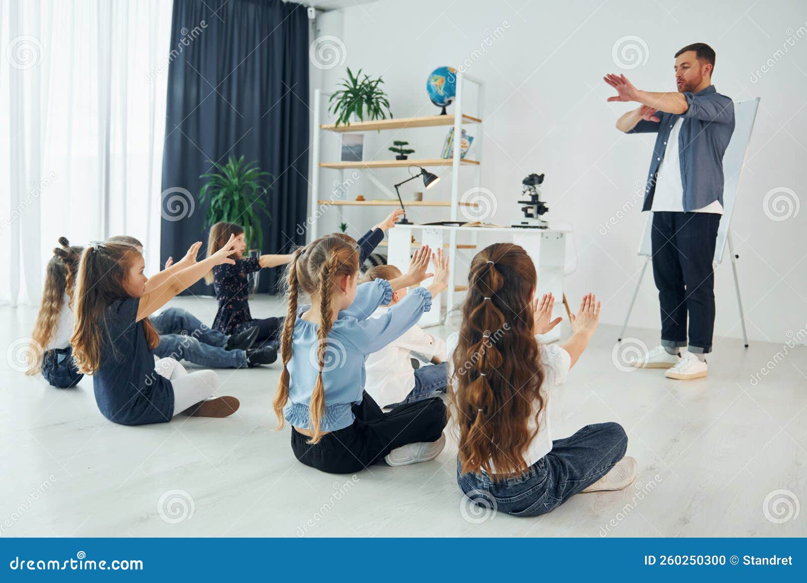 Learning Gesture Language. Group of Children Students in Class at ...