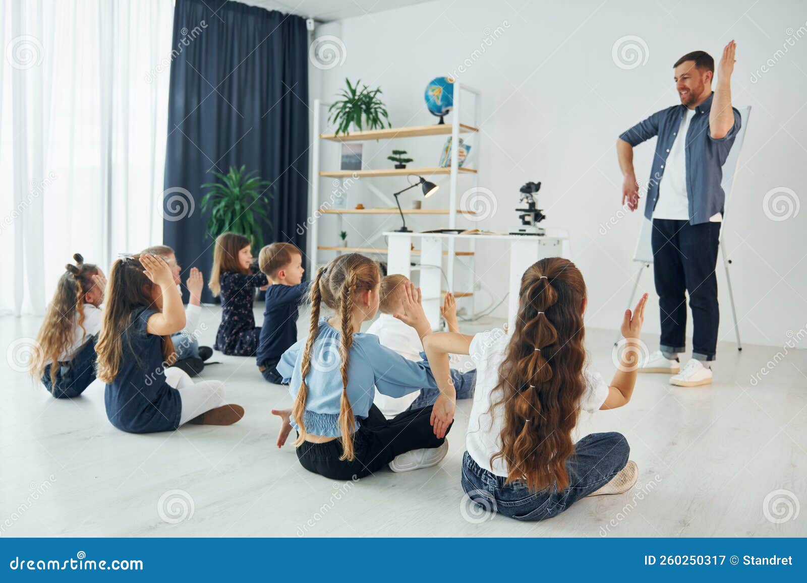 Learning Gesture Language. Group of Children Students in Class at ...
