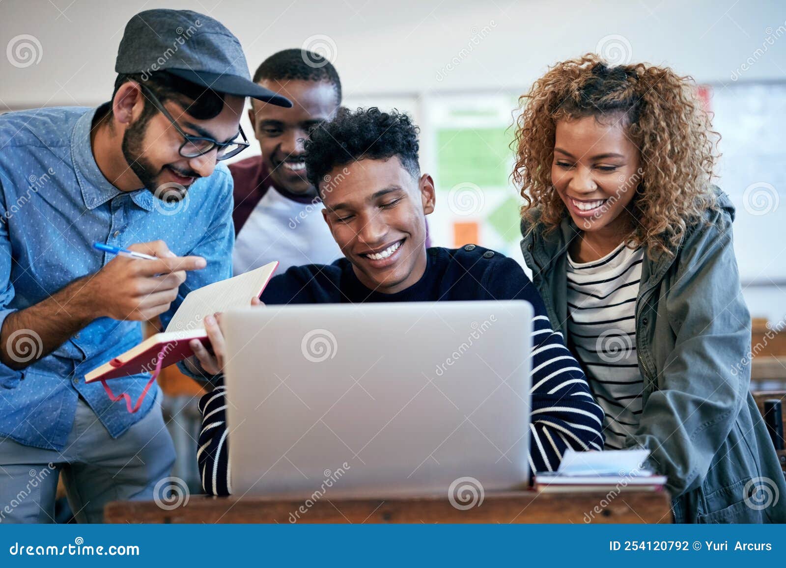 Learning Great Things Together. University Students Sitting in Class ...