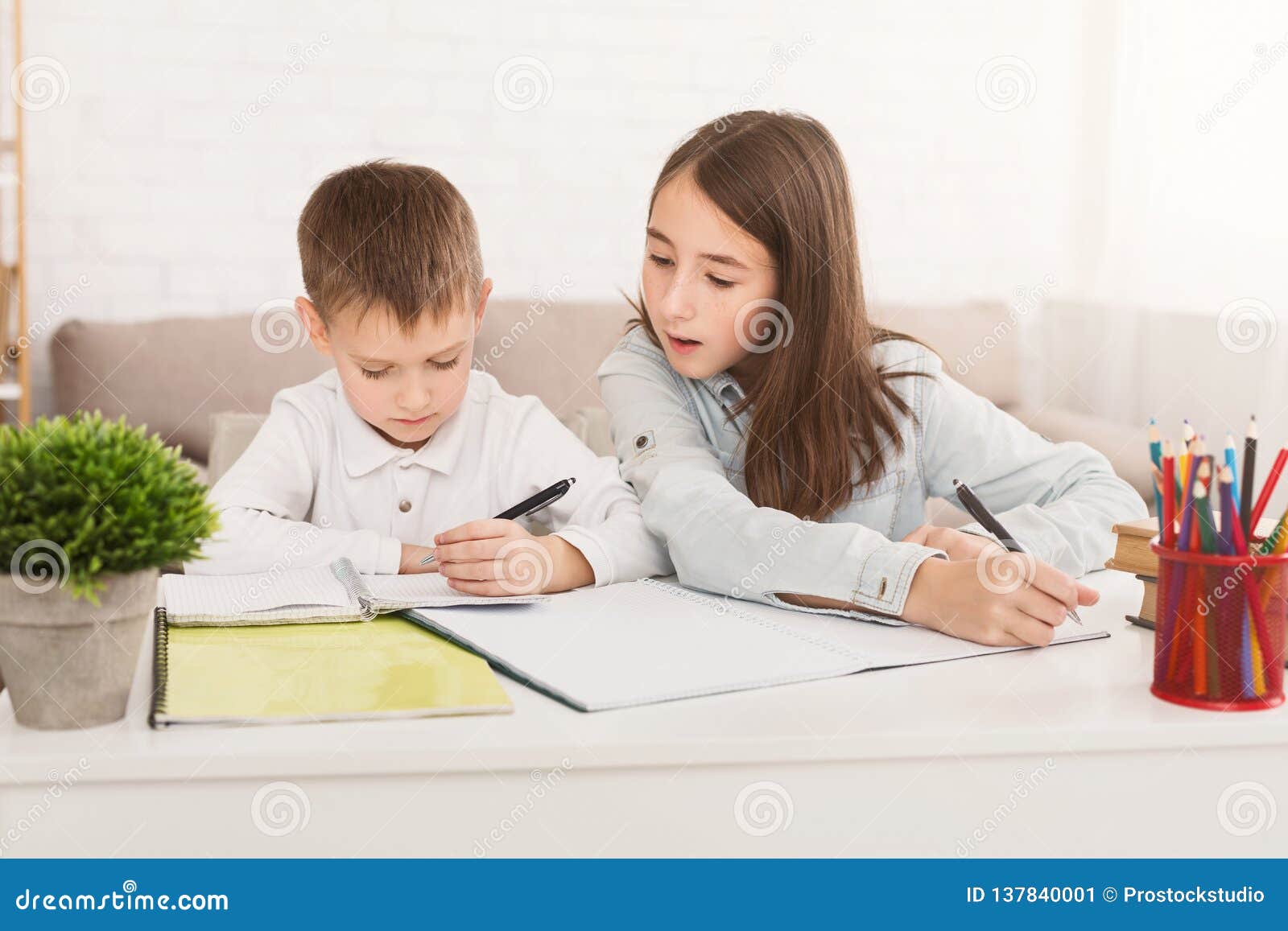 Learning at Home. Sister Helping Brother Doing Homework Stock Image ...