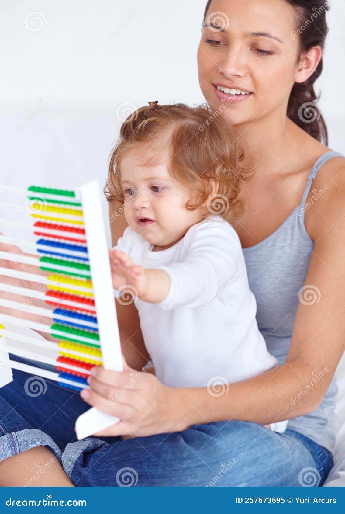 Learning at Home. a Young Mother Teaching Her Baby Daughter the Basics ...
