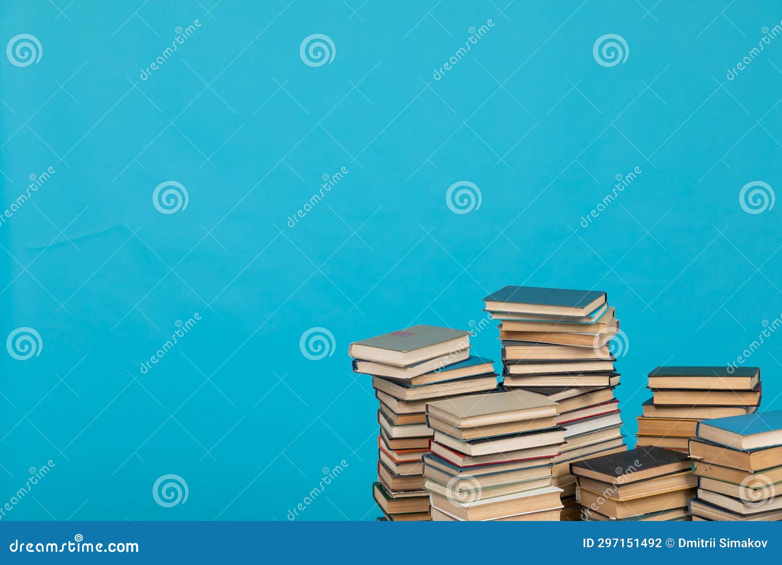 Learning Library Science Stack of Books on a Blue Background Stock ...