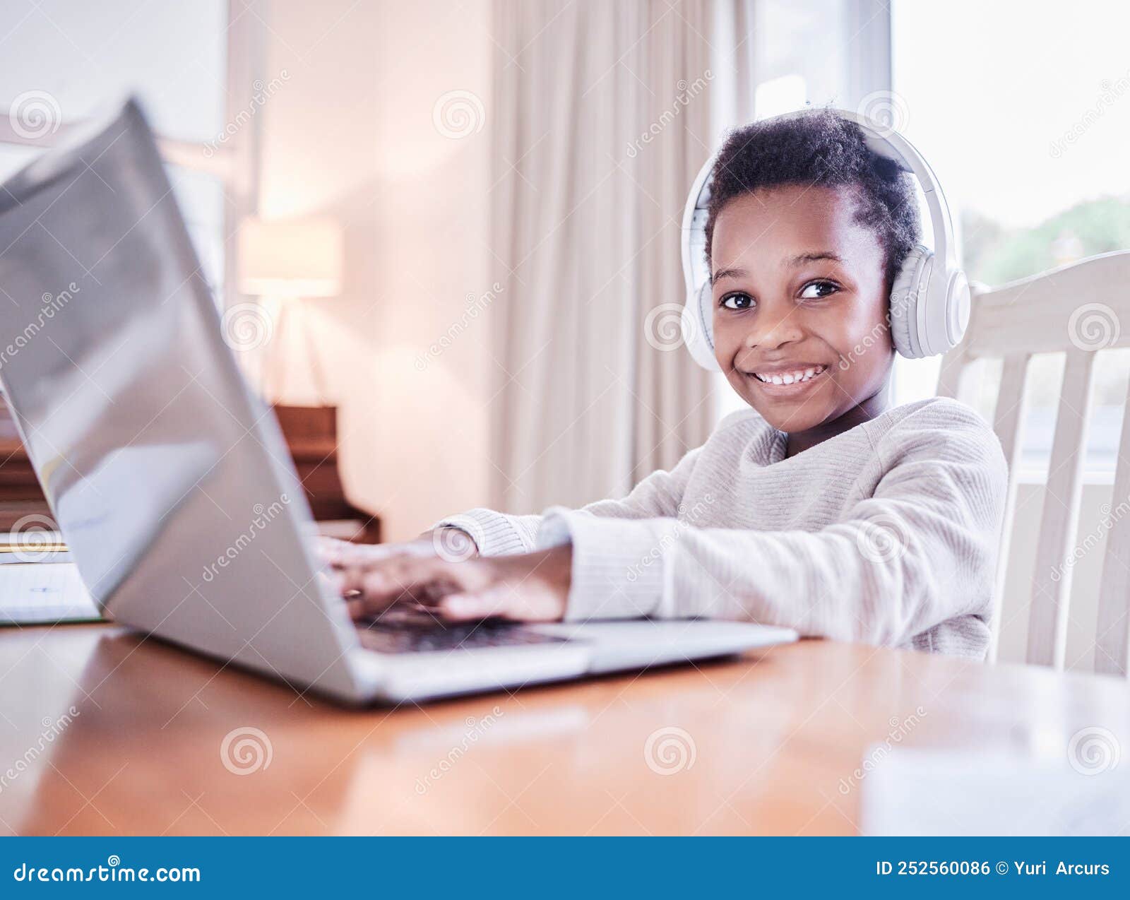 Learning is a Lifelong Process. a Young Boy Doing His Homework on a ...