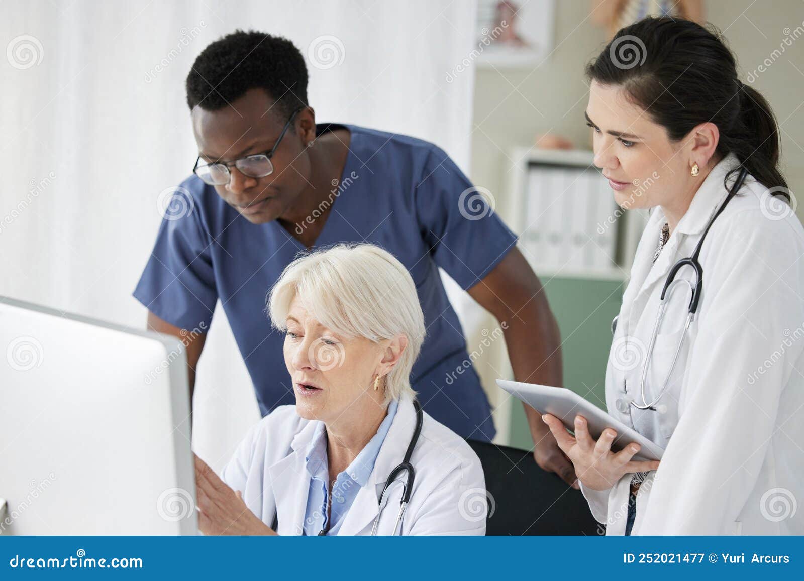 The Learning Never Stops. a Senior Doctor Giving Her Staff Members ...