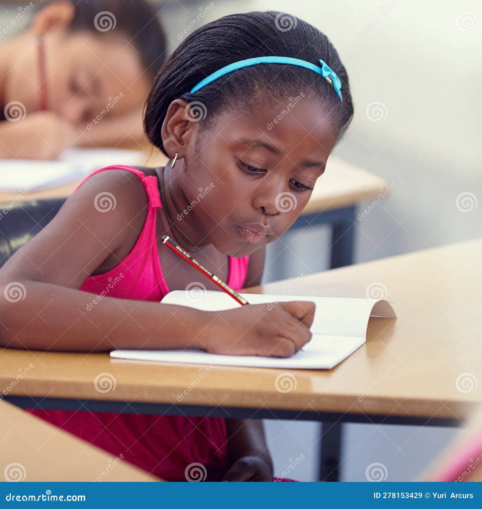 Learning Something New Every Day. a Cute Little Girl Doing Her Work in ...