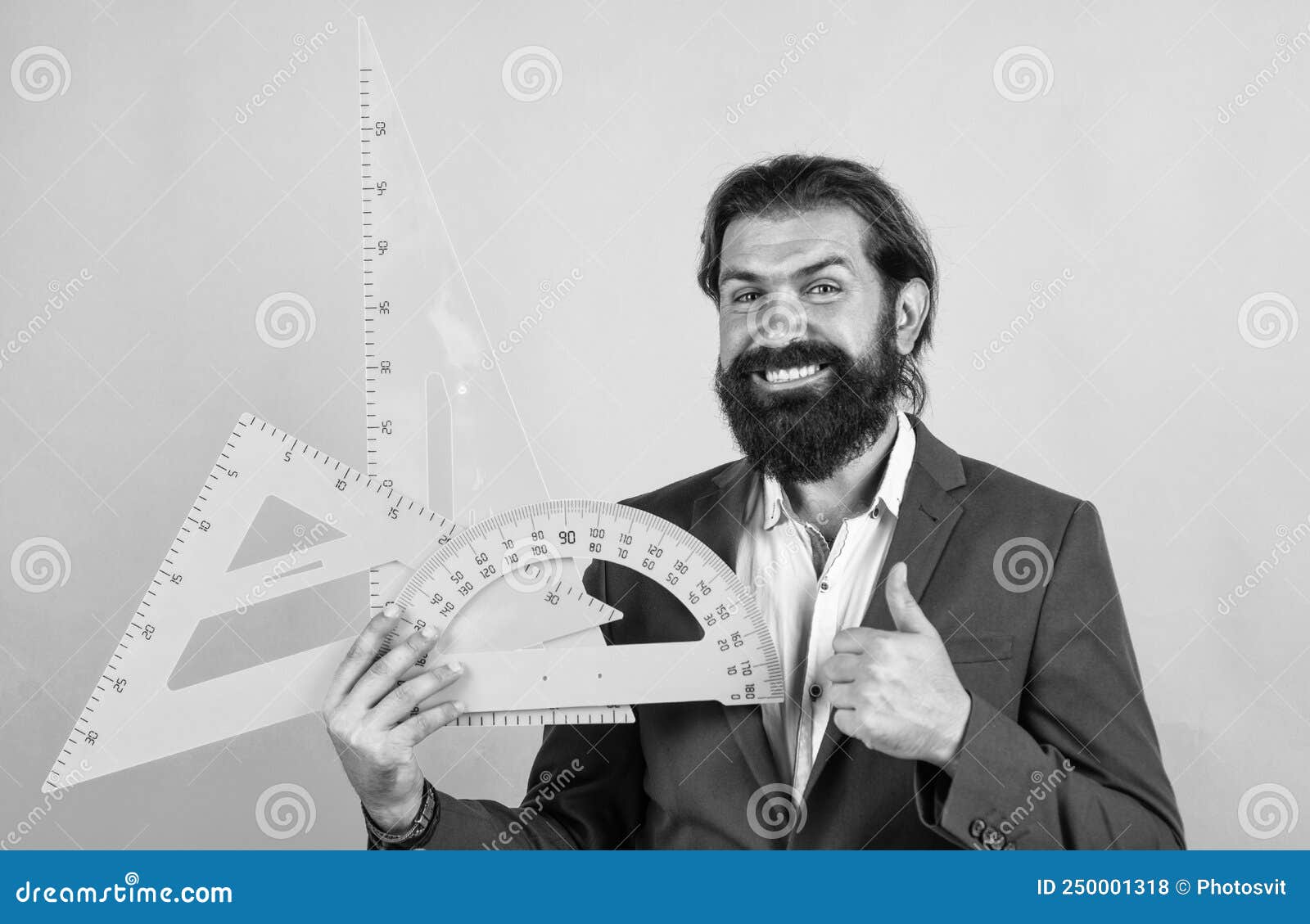 Learning the Subject. Happy Man with Beard Use Triangle and Protractor ...