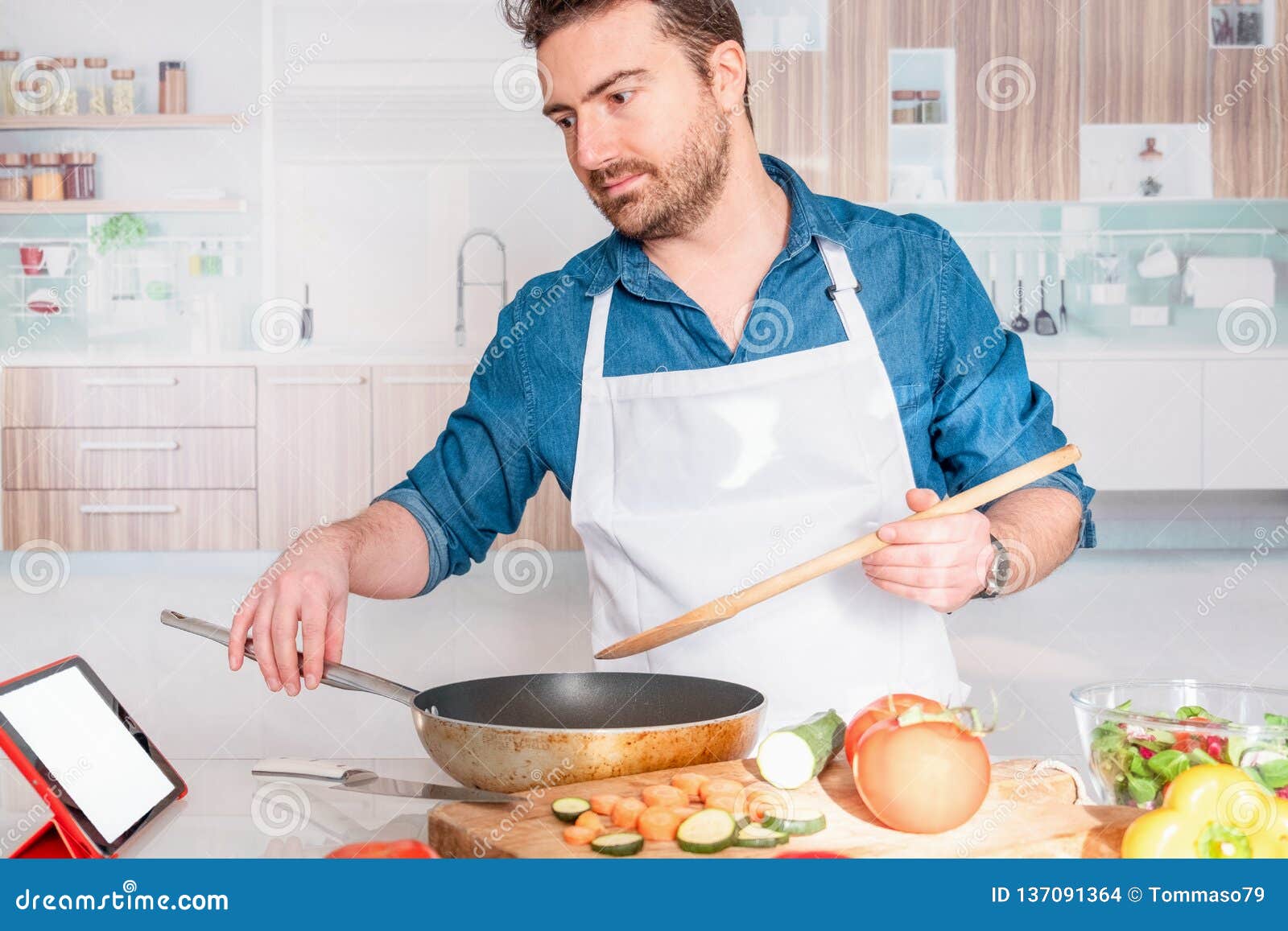 Learning To Cook Using Internet App Online Stock Photo - Image of ...