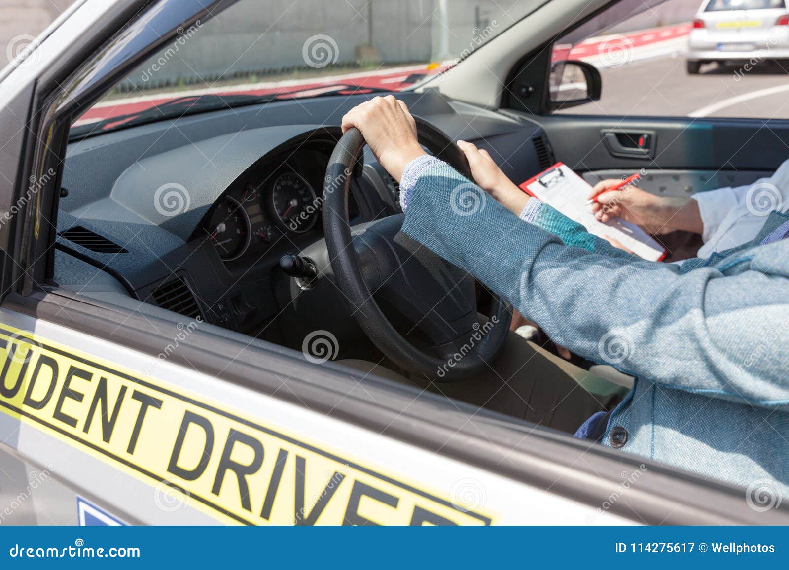 Learning To Drive a Car with a Driving Instructor. Student Drive Stock ...
