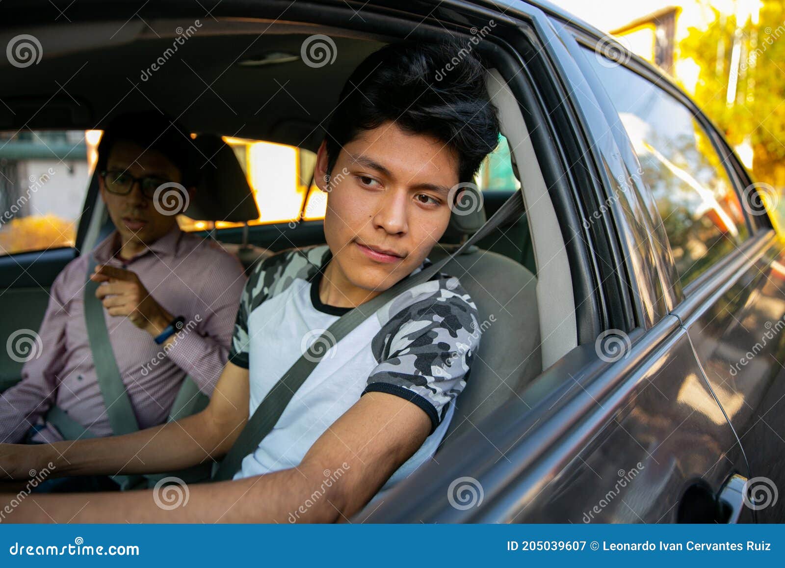 Learning To Drive. Two Young Men in a Driving Session Stock Image ...