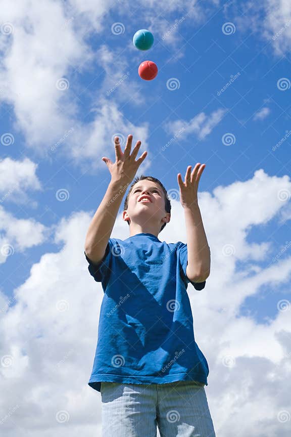 Learning to juggle stock image. Image of jeans, dexterity - 5939811