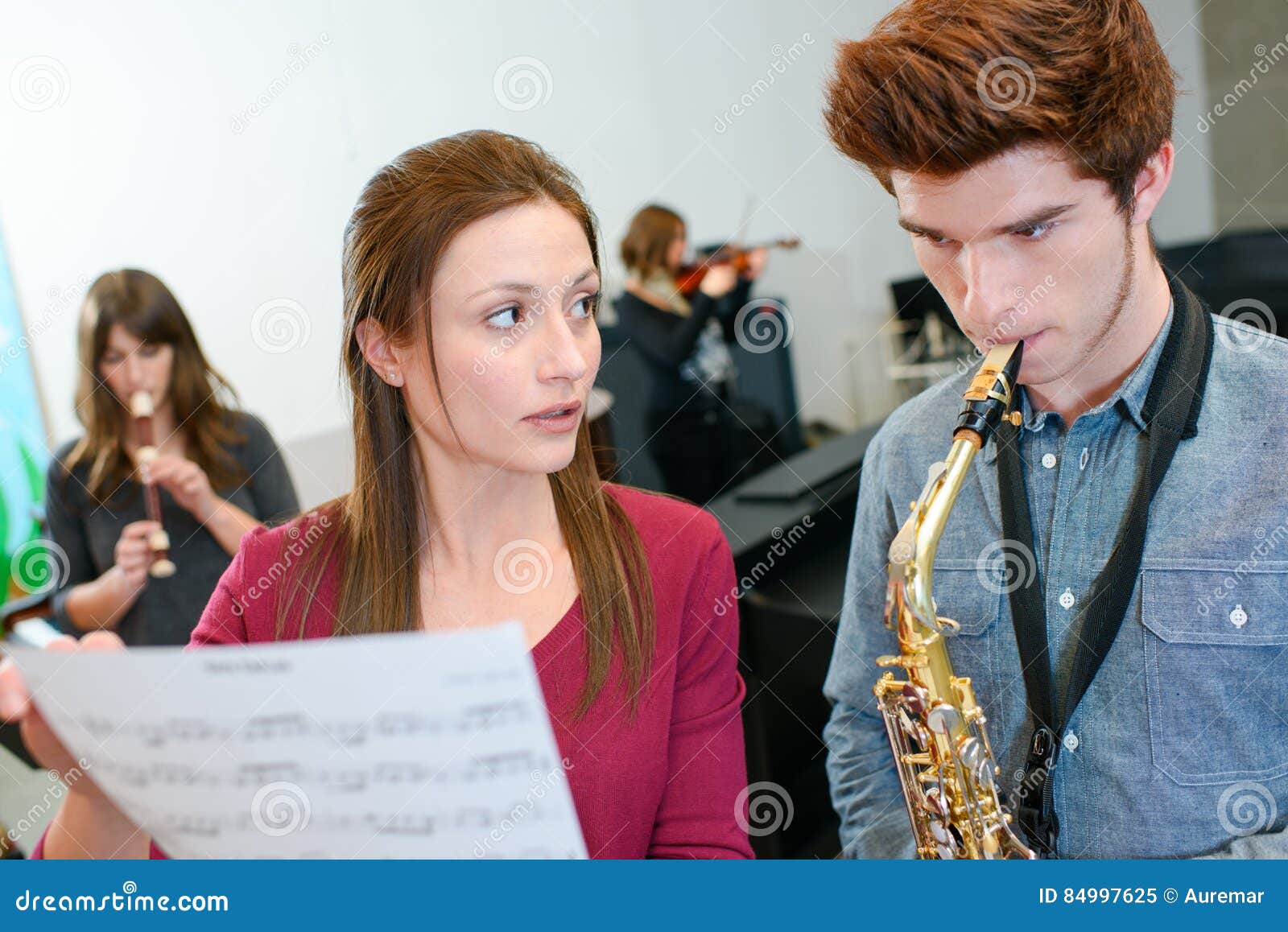 Learning to play sax stock image. Image of jazz, brass - 84997625