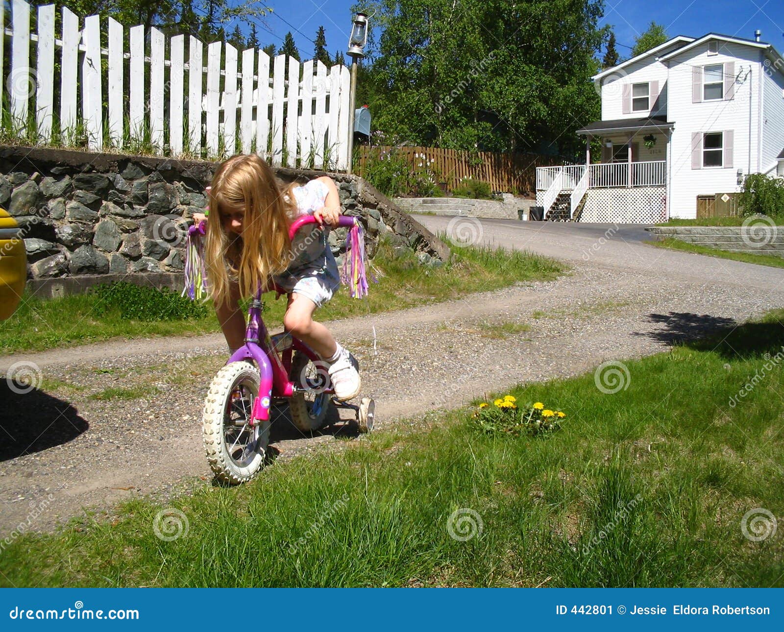 Learning to ride a bike stock image. Image of bicycle, house - 442801