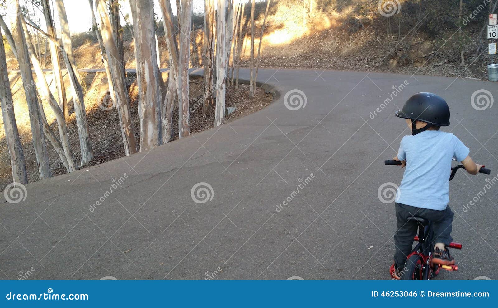 Learning to ride a bike editorial photo. Image of path - 46253046