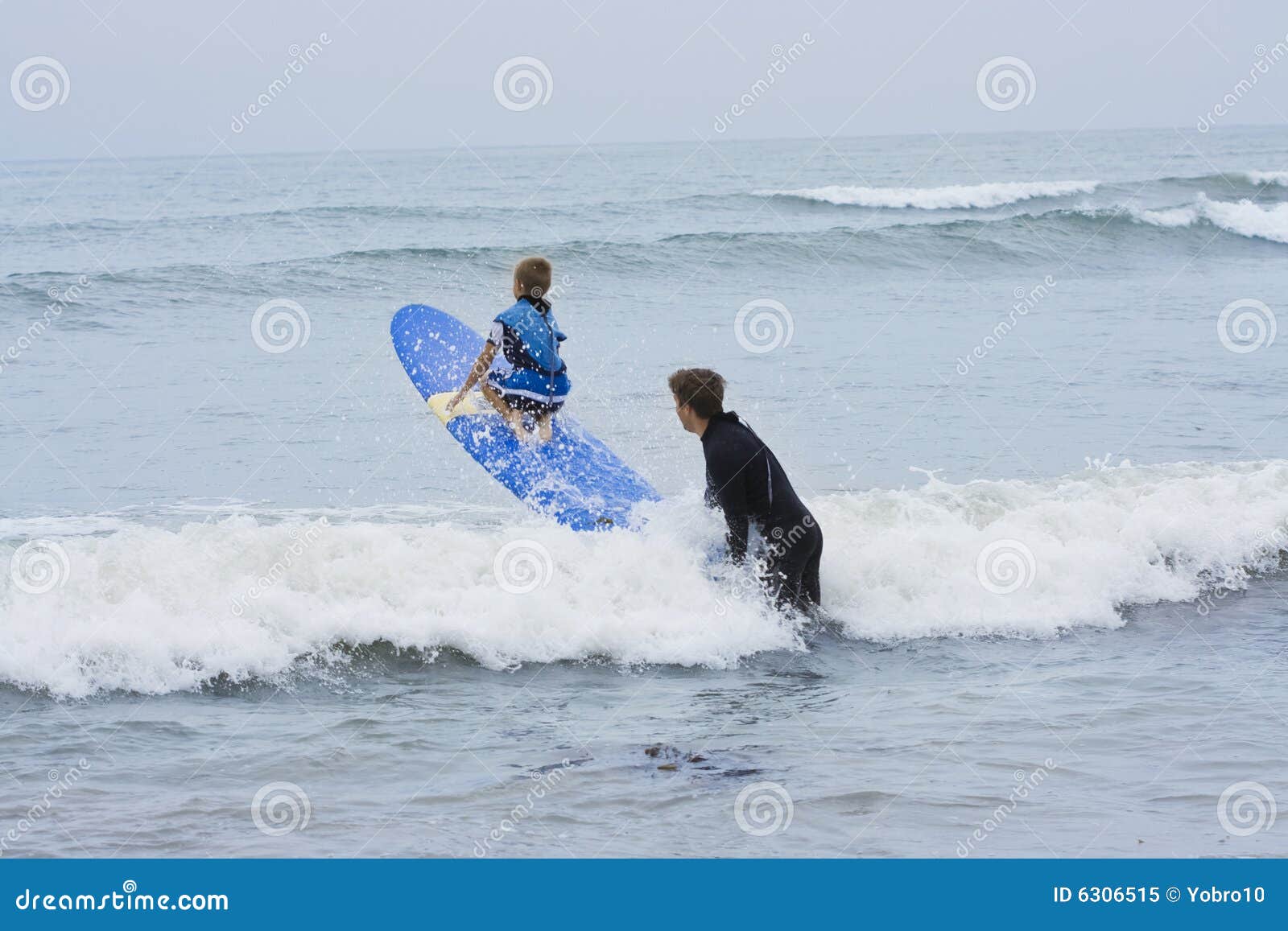Learning to Surf stock image. Image of learn, help, sport - 6306515