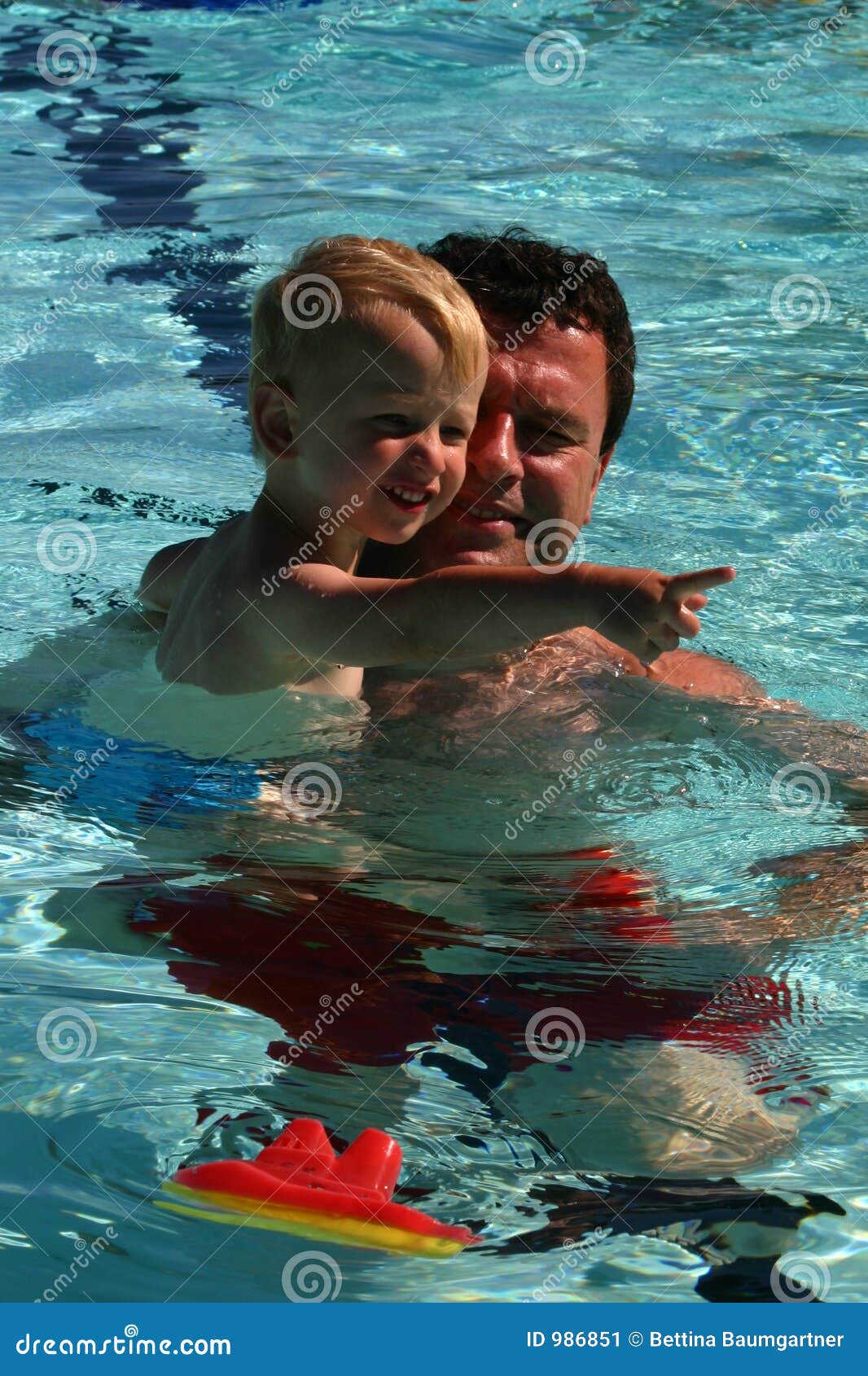 Learning to swim stock image. Image of love, play, pointing - 986851