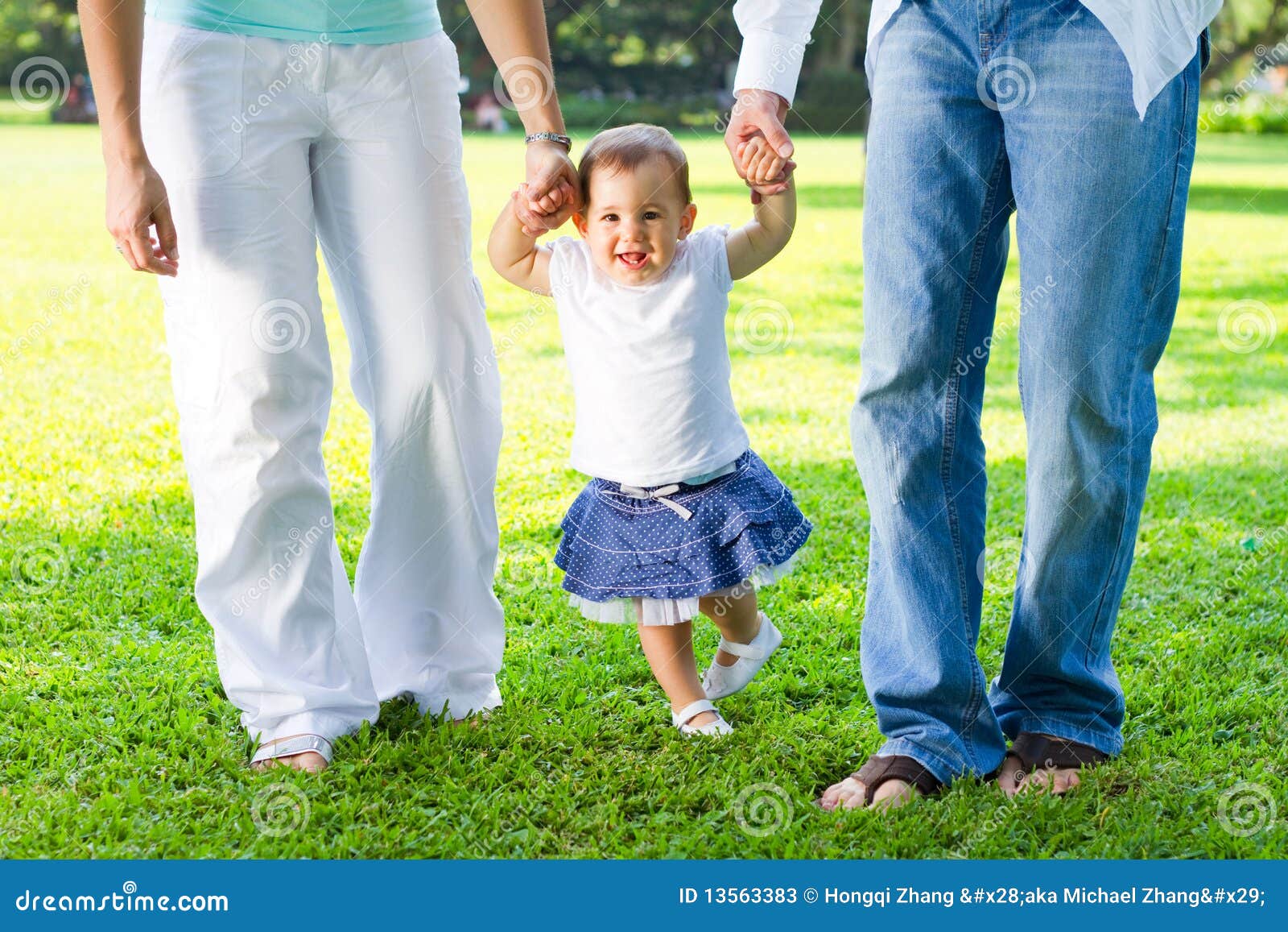 Learning to walk stock image. Image of family, caring - 13563383