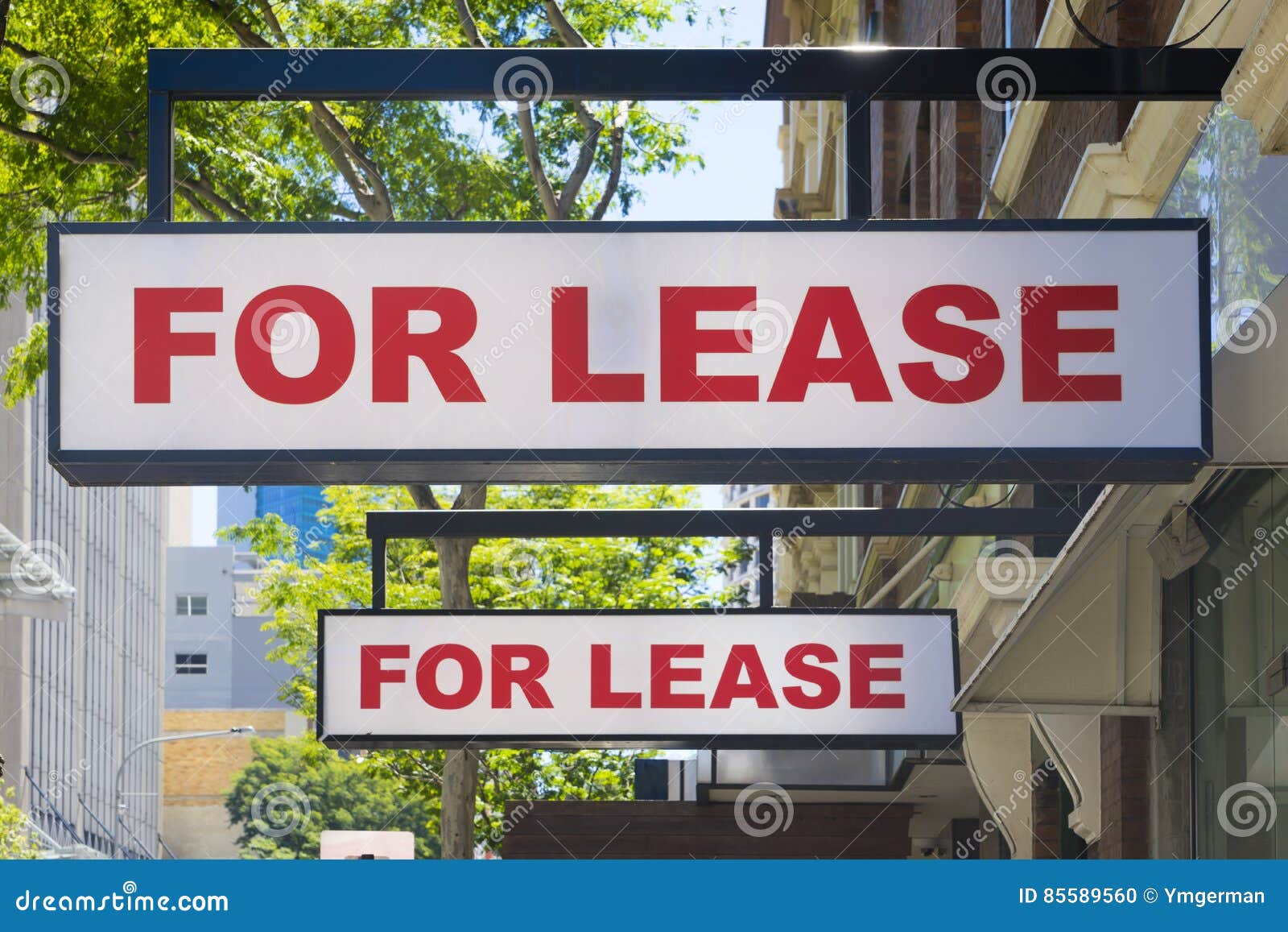 For Lease Signs on Display Outside Buildings Stock Photo - Image of ...