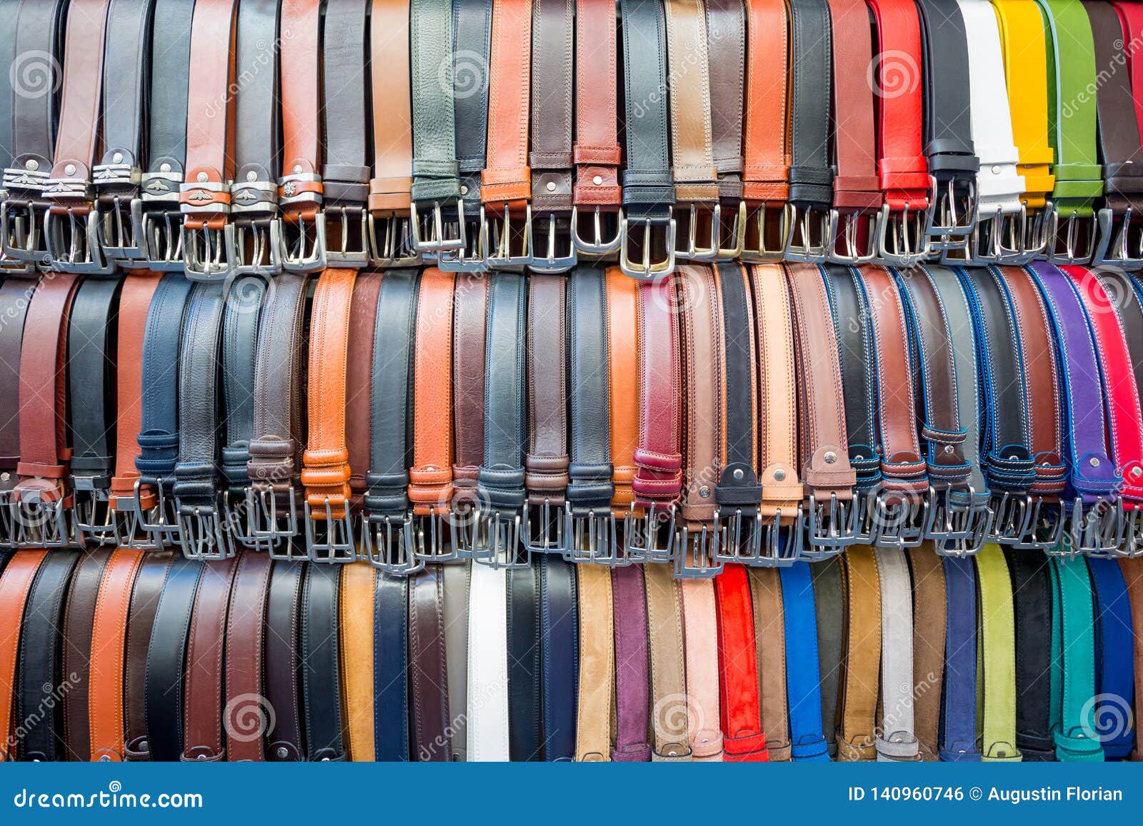 Leather belts stand stock photo. Image of black, outside - 140960746