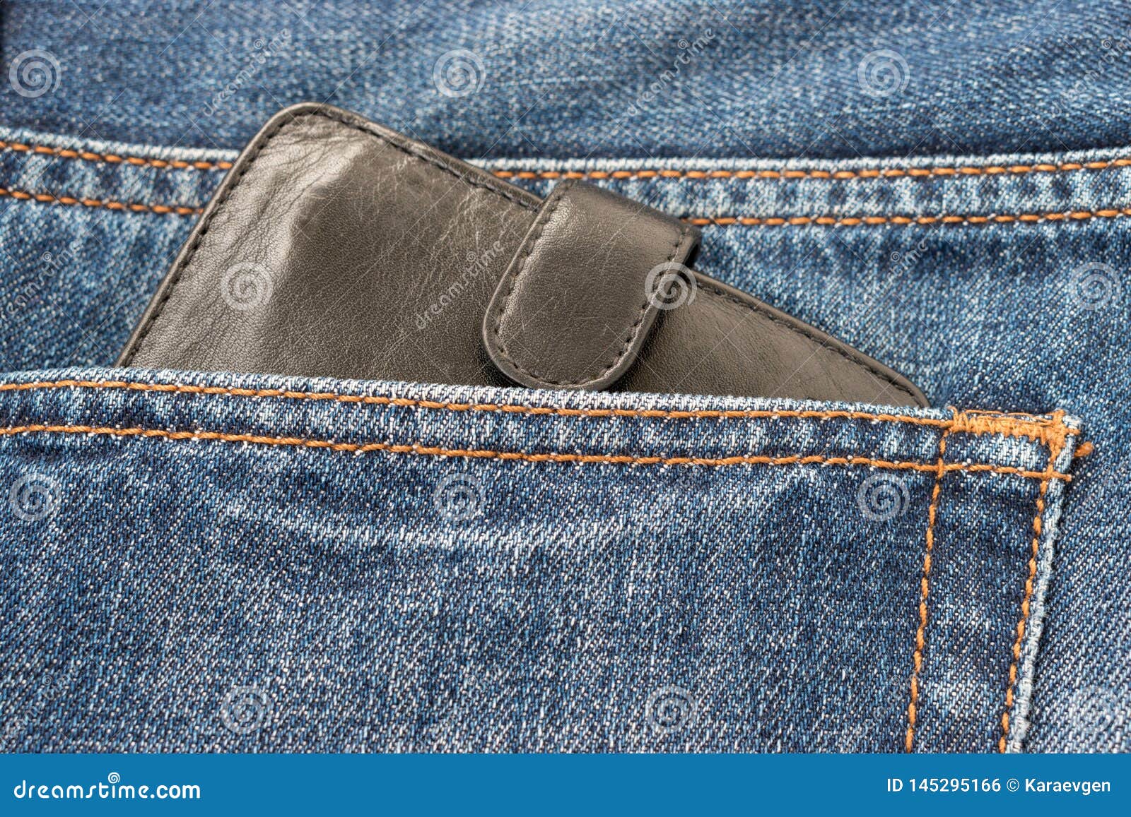 Leather Black Wallet in the Jeans Pocket Stock Photo - Image of hand ...