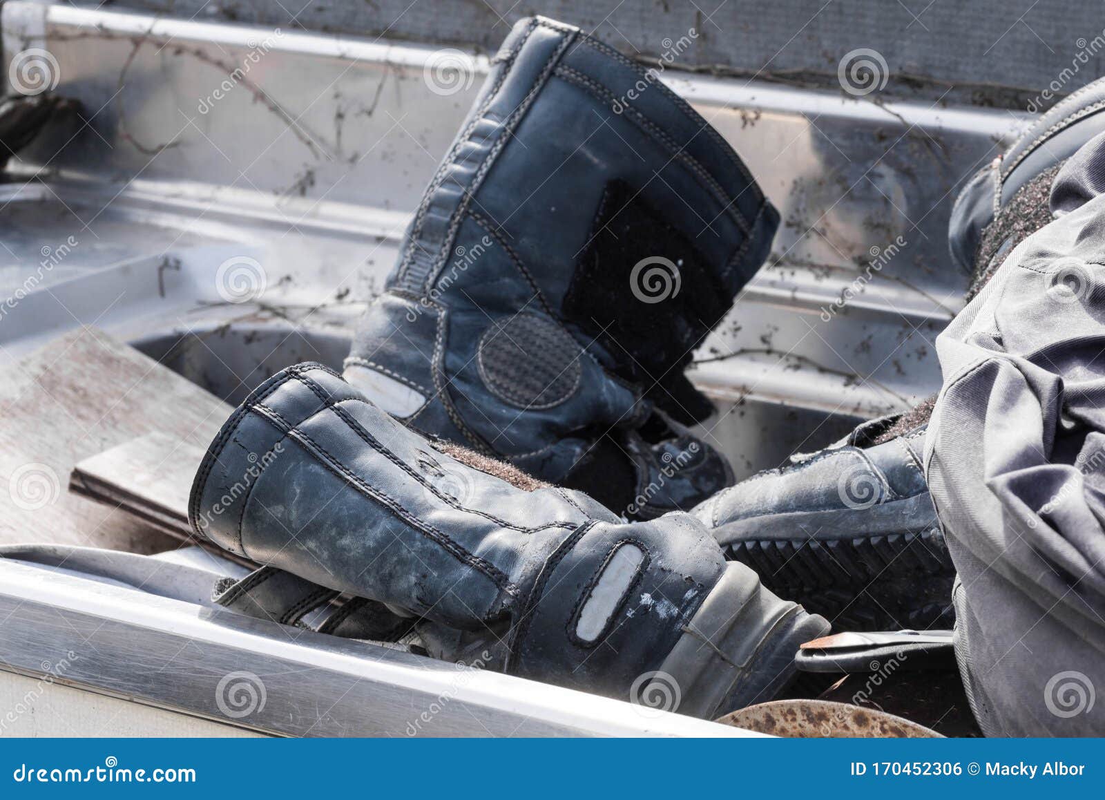 Old Pair of Leather Boots Thrown in an Old Sink at a Garbage Dump Site ...