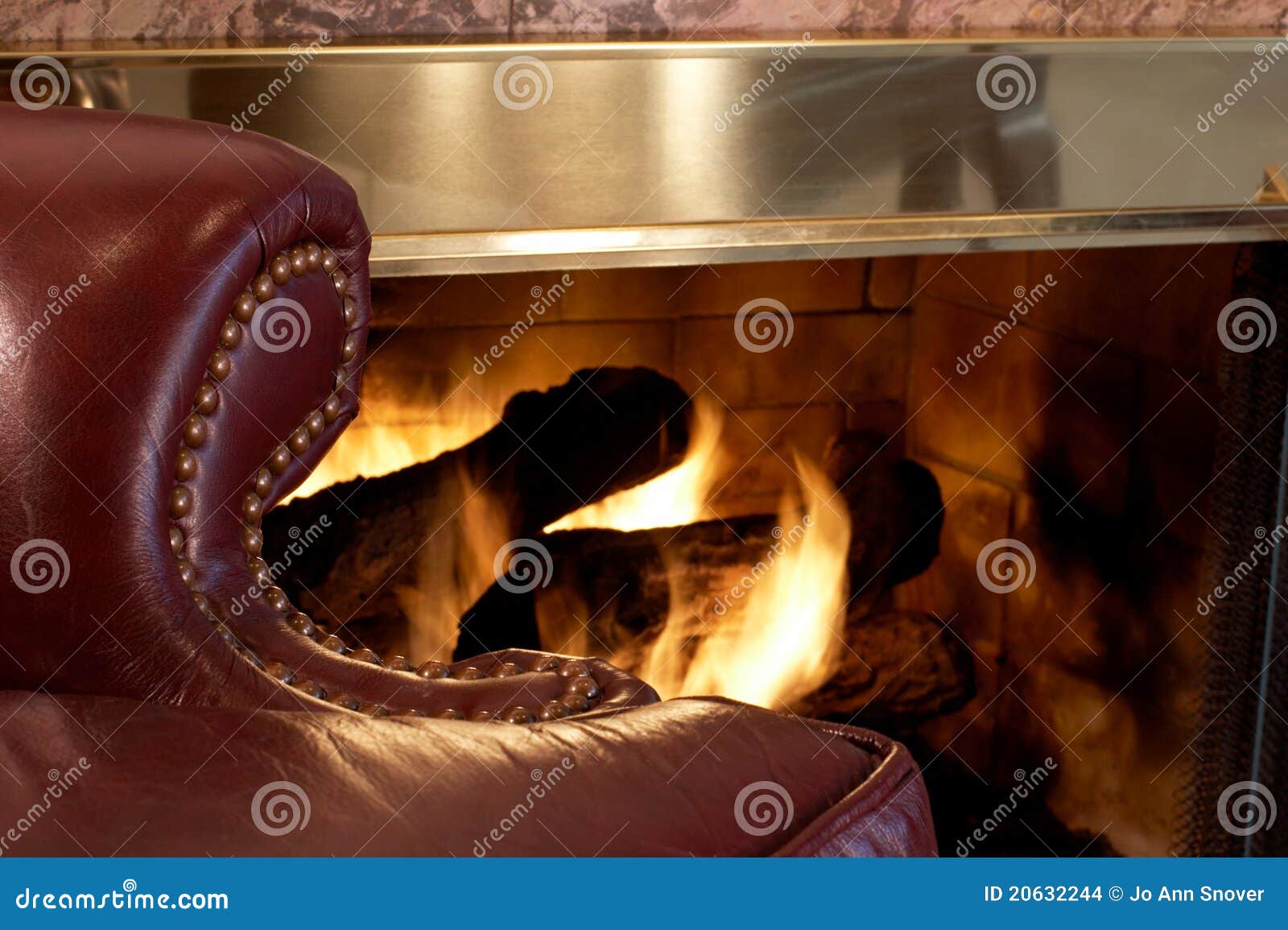 Leather chair by the fire stock photo. Image of leather - 20632244