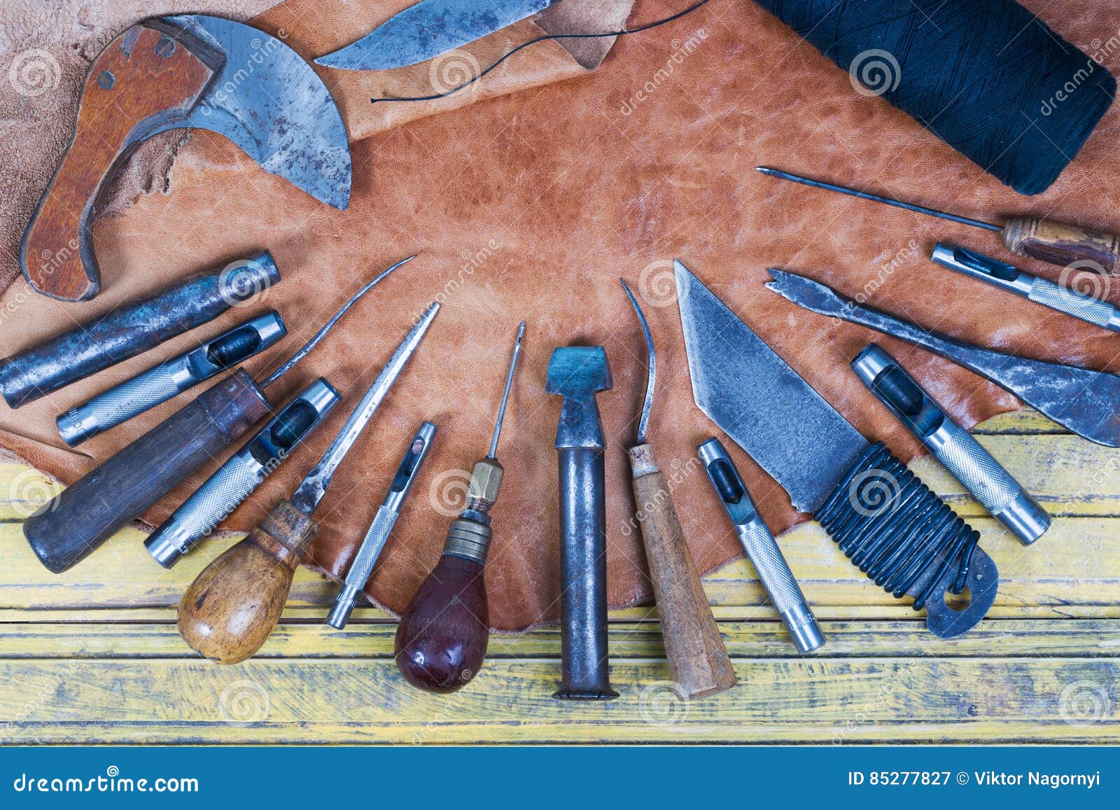 Leather Craft Tools On A Wooden Background. Leather Craftmans Work Desk ...