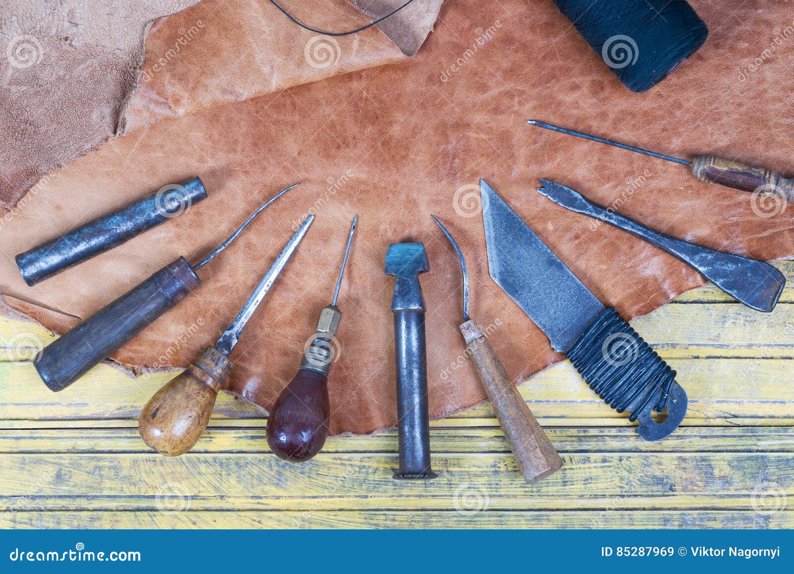 Leather Craft Tools on a Wooden Background. Leather Craftmans Work Desk ...