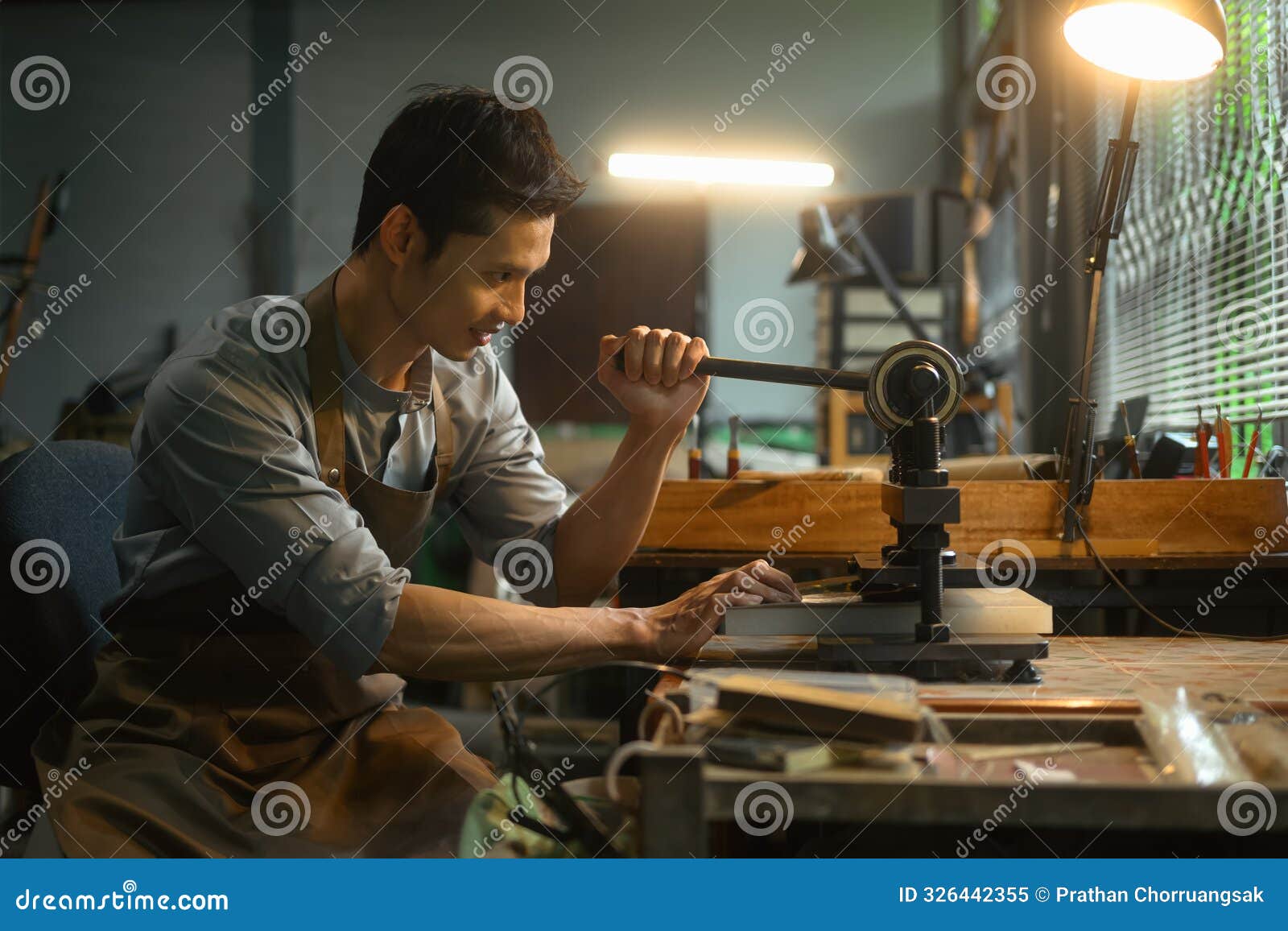 Leather Craftsman Creating Product at His Workbench. Small Business and ...