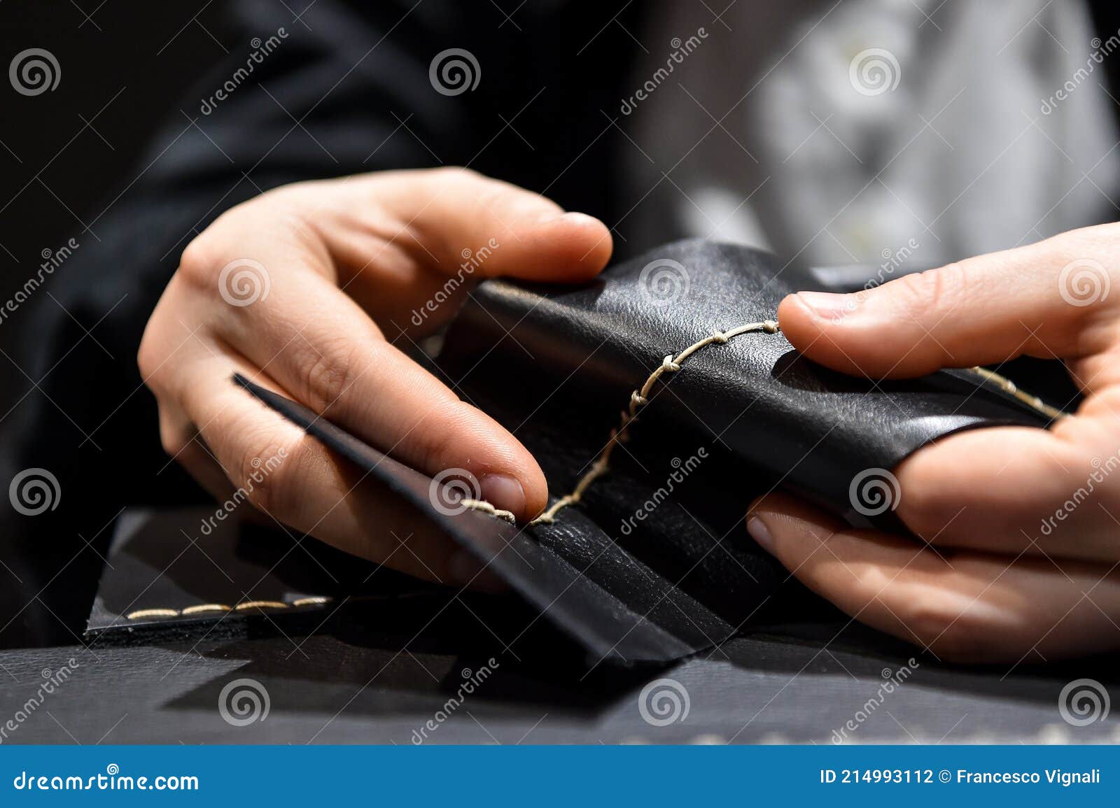 A Leather Craftsman Works with Leather. Sews Leather Goods Stock Photo ...