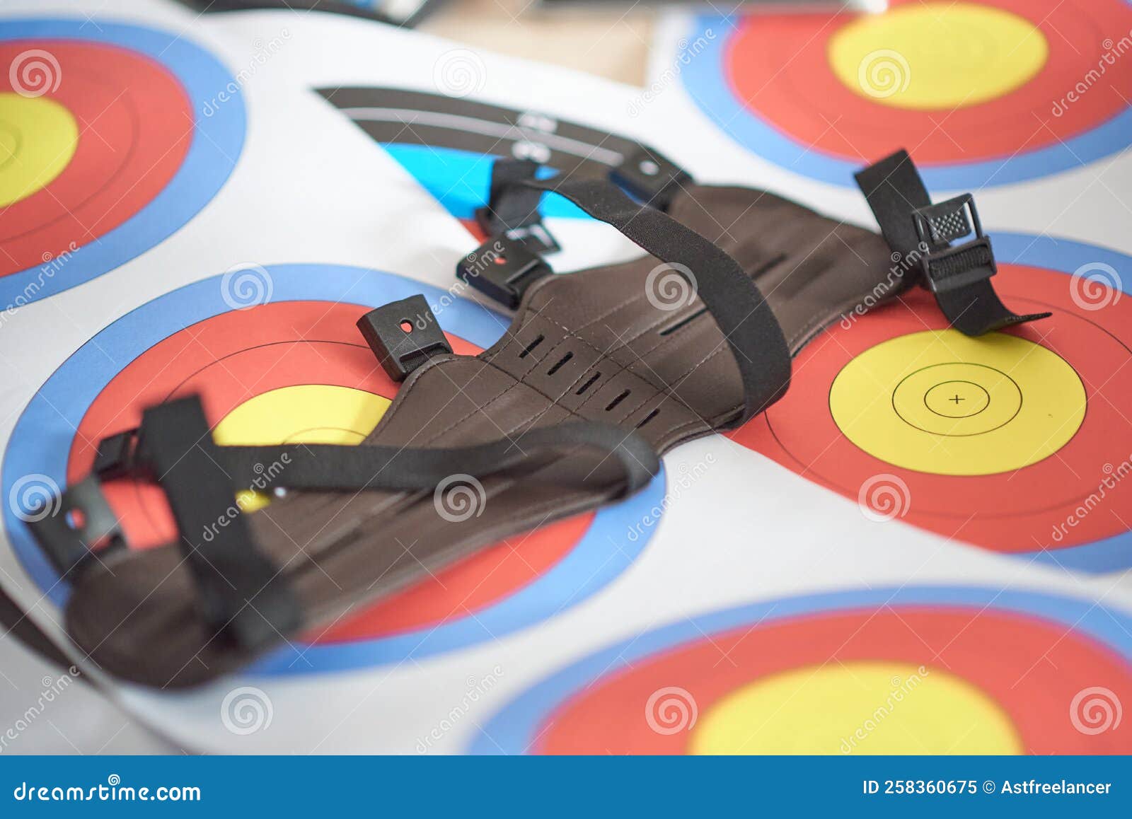 Leather Gauntlet for Hunting or Archery Lies on a Pack of Shooting ...