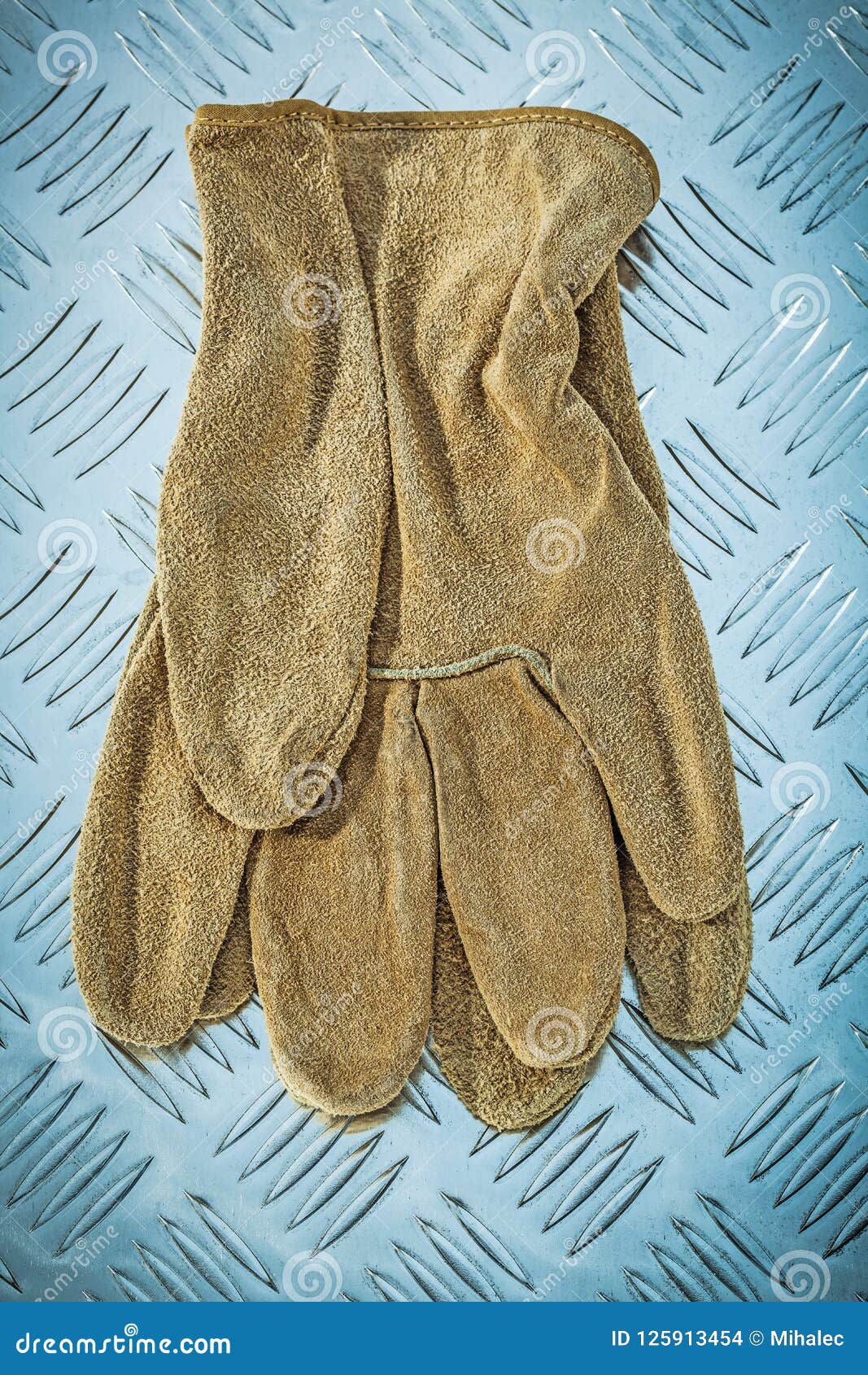 Leather Protective Gloves on Fluted Metal Texture Stock Photo - Image ...
