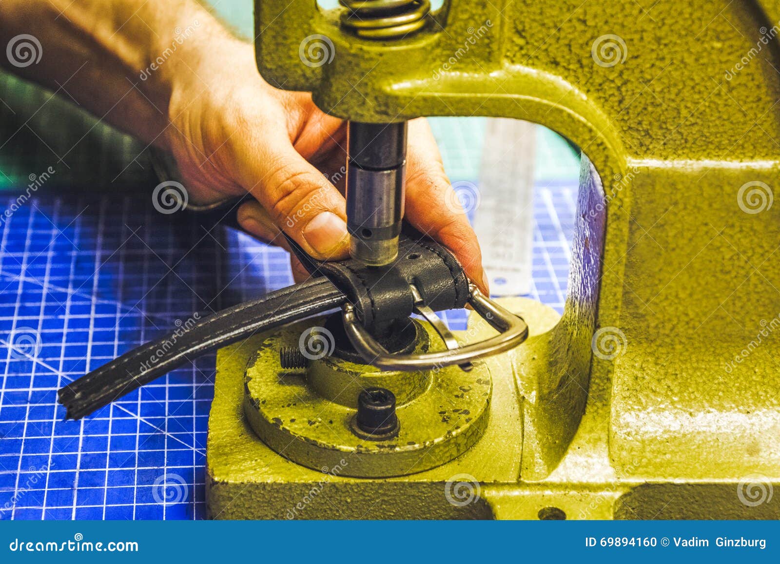 Leather Workshop Master Grips the Belt To Insert Buckle Stock Photo ...