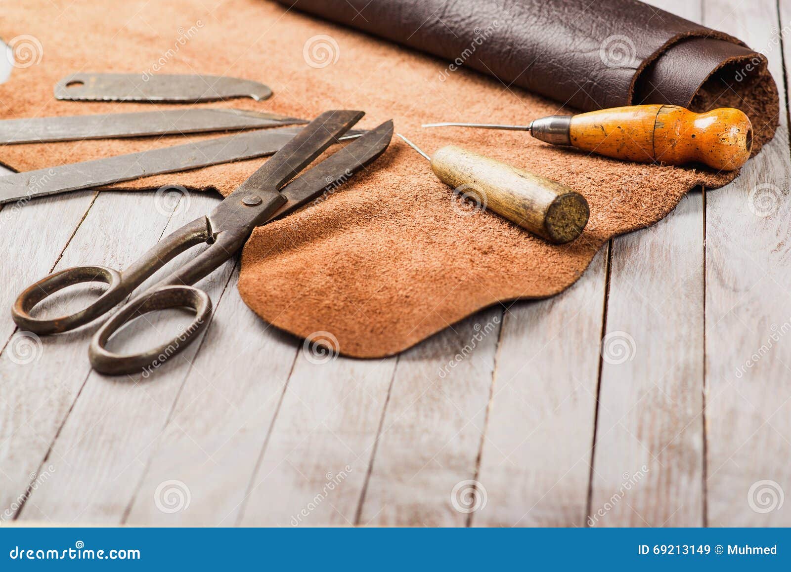 Leathersmith S Work Desk . Pieces of Hide and Leather Working Tools on ...