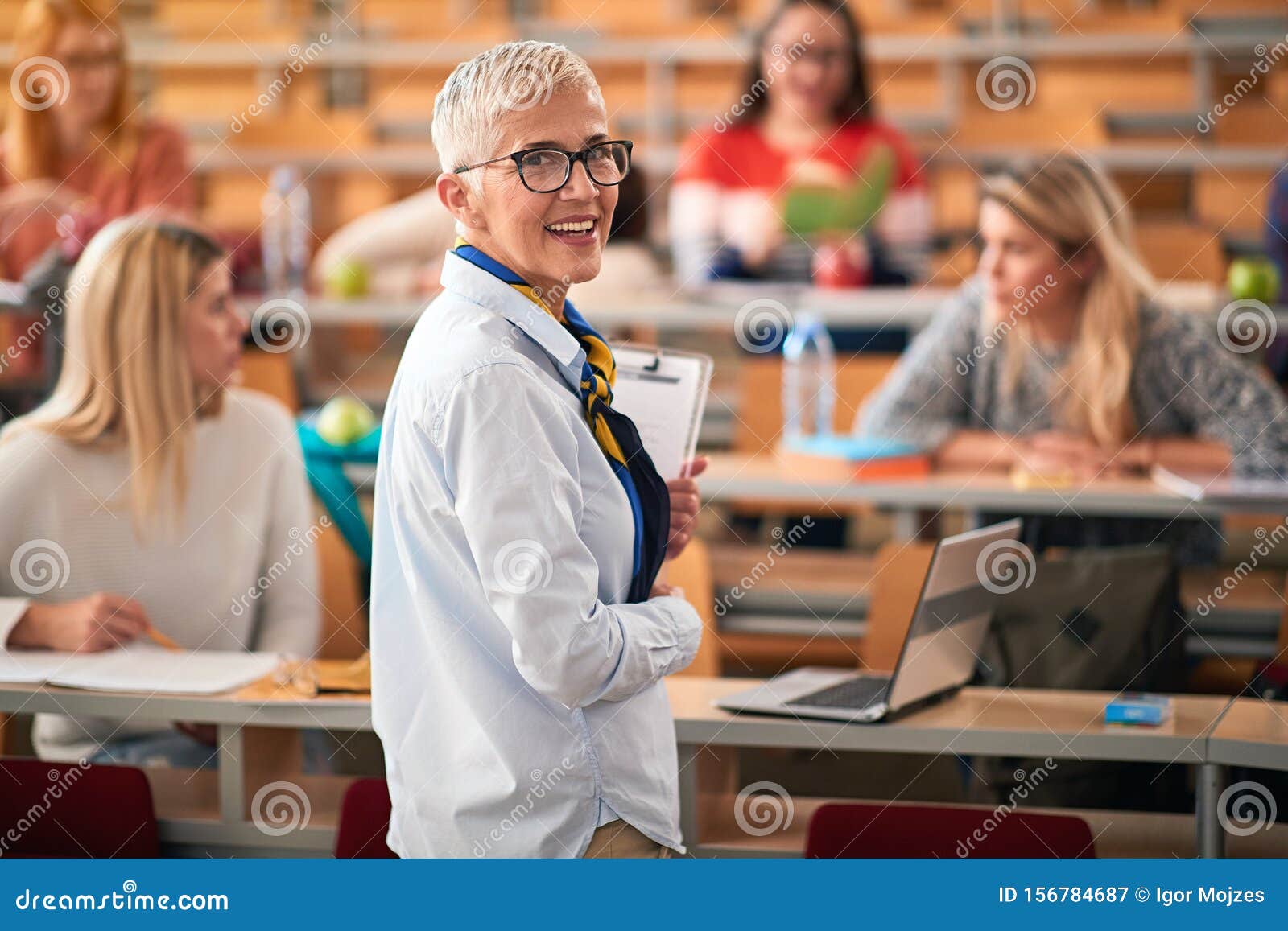 Lecture at University. Speaker Giving Presentation in Lecture Hall at ...