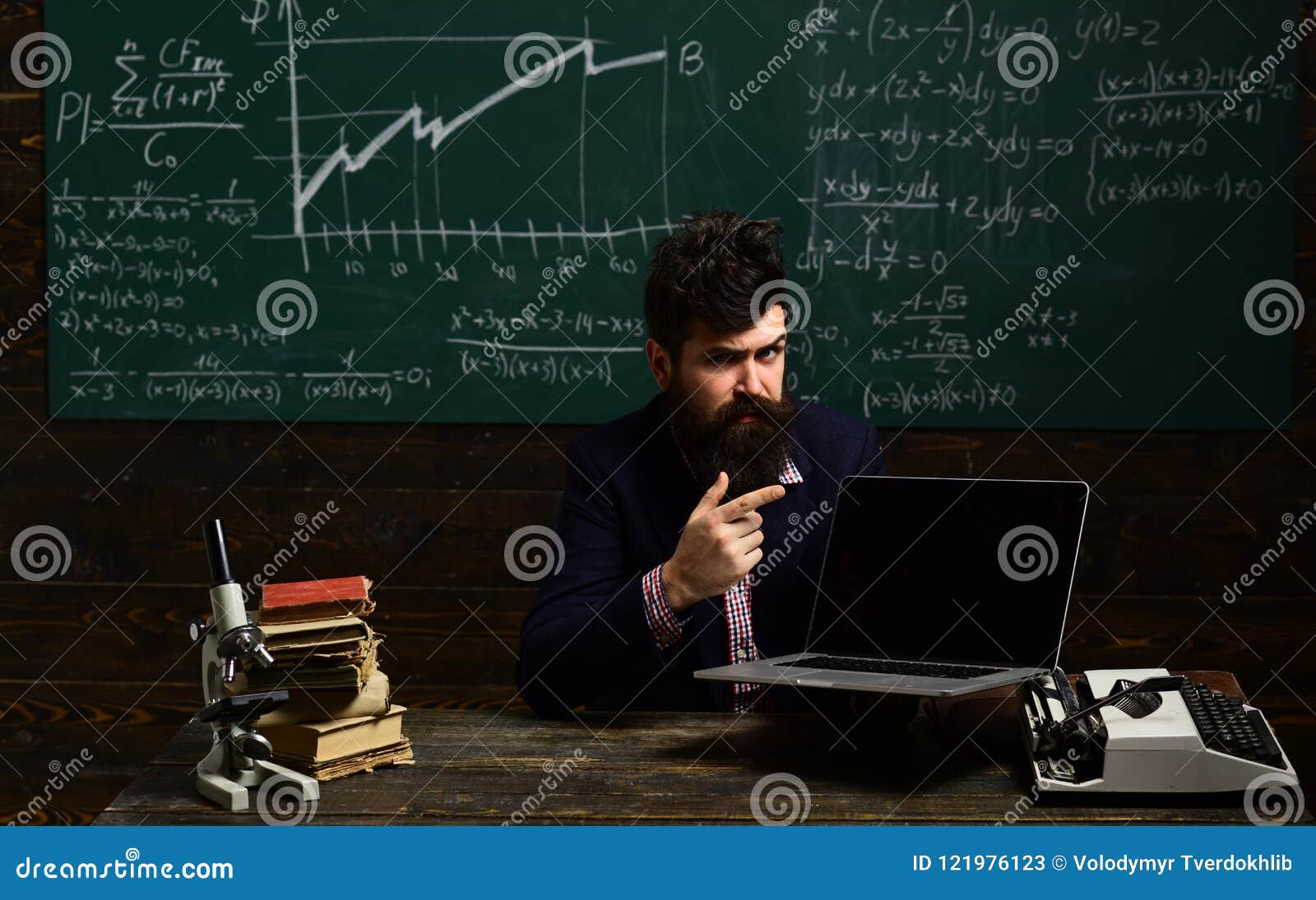 Lecturer Discussing Architectural Issues with Students during Workshop ...