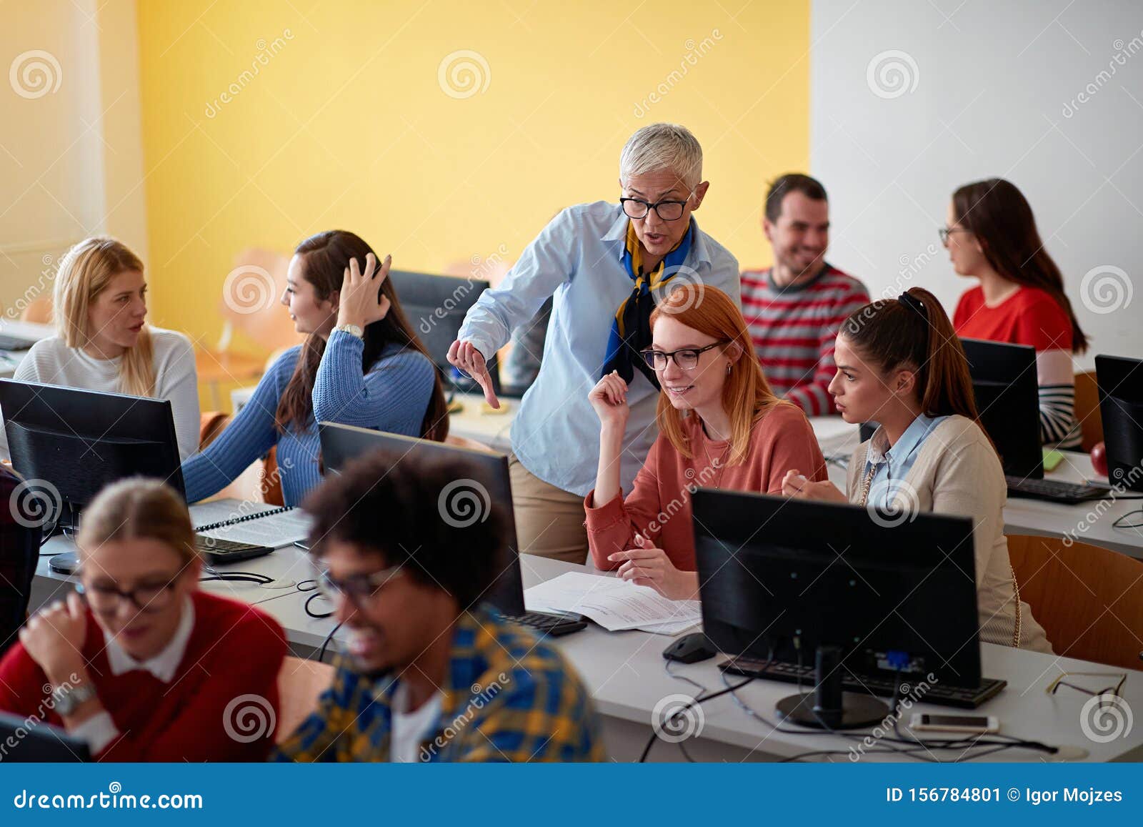Lecturer Helping Students on Project on University Stock Image - Image ...