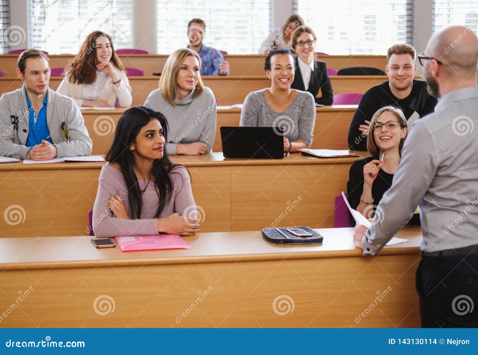 Lecturer And Multinational Group Of Students In An Auditorium Royalty ...