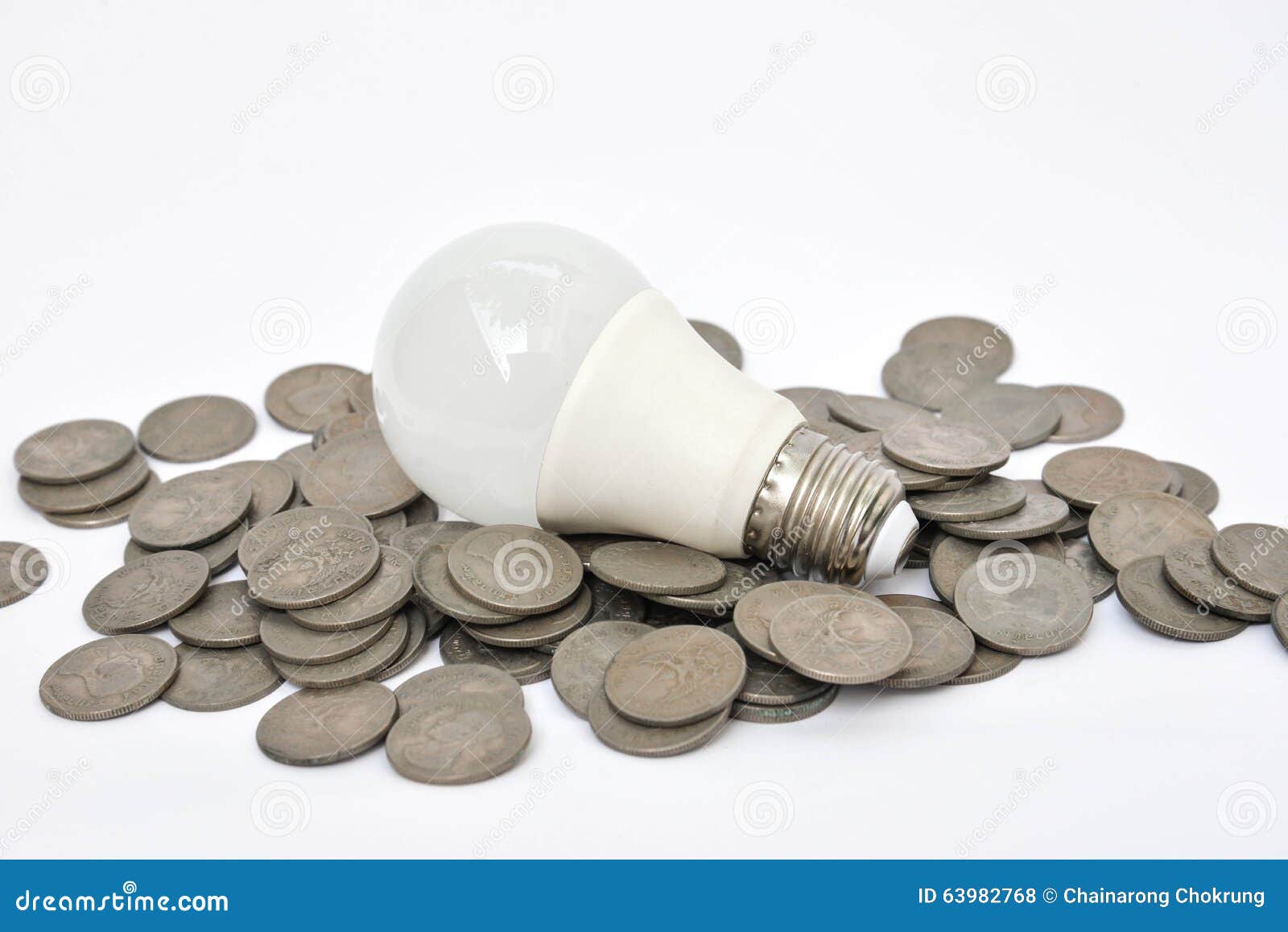 LED Bulb and coins stock photo. Image of energy, coins - 63982768