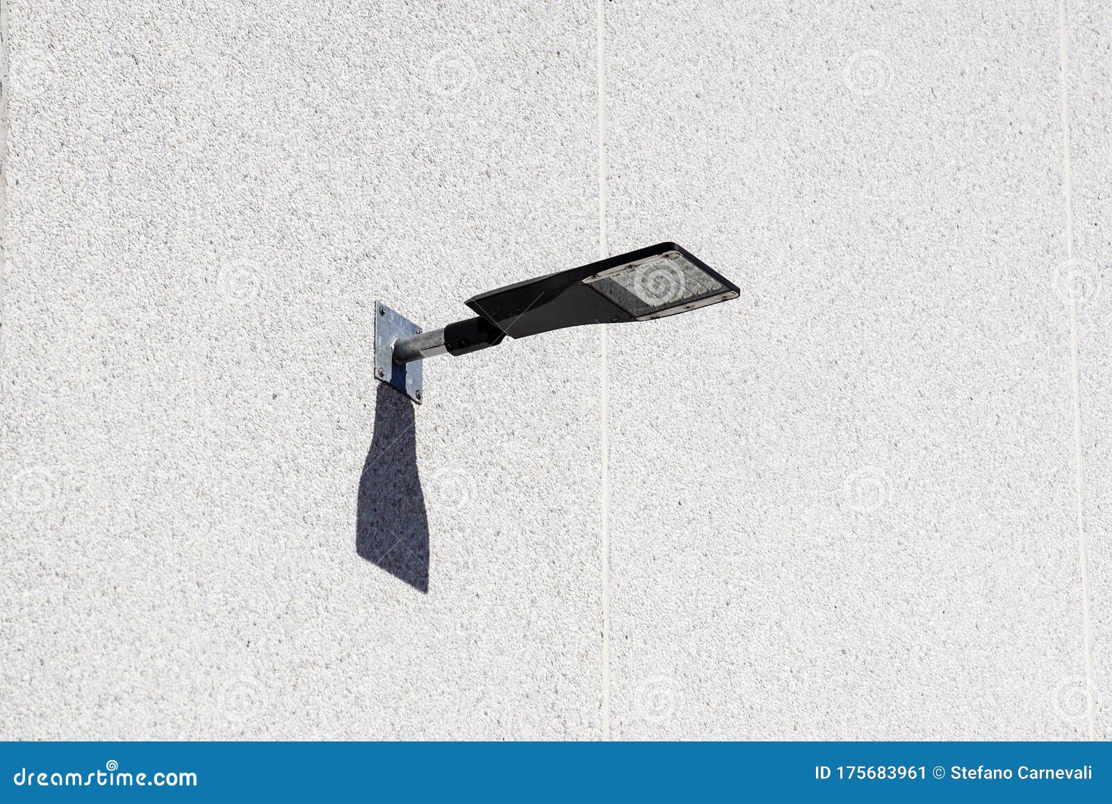 LED Fixed on To a Bend Lamp Post in Front of a Building. the Lamp Post ...