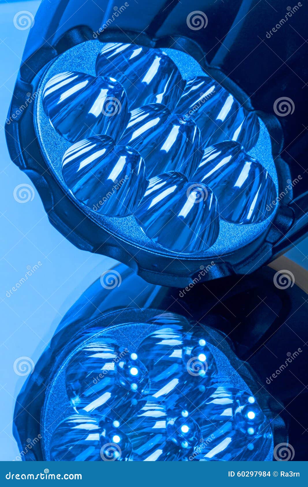 LED Flashlight in a Blue Light Stock Photo - Image of light, savings ...