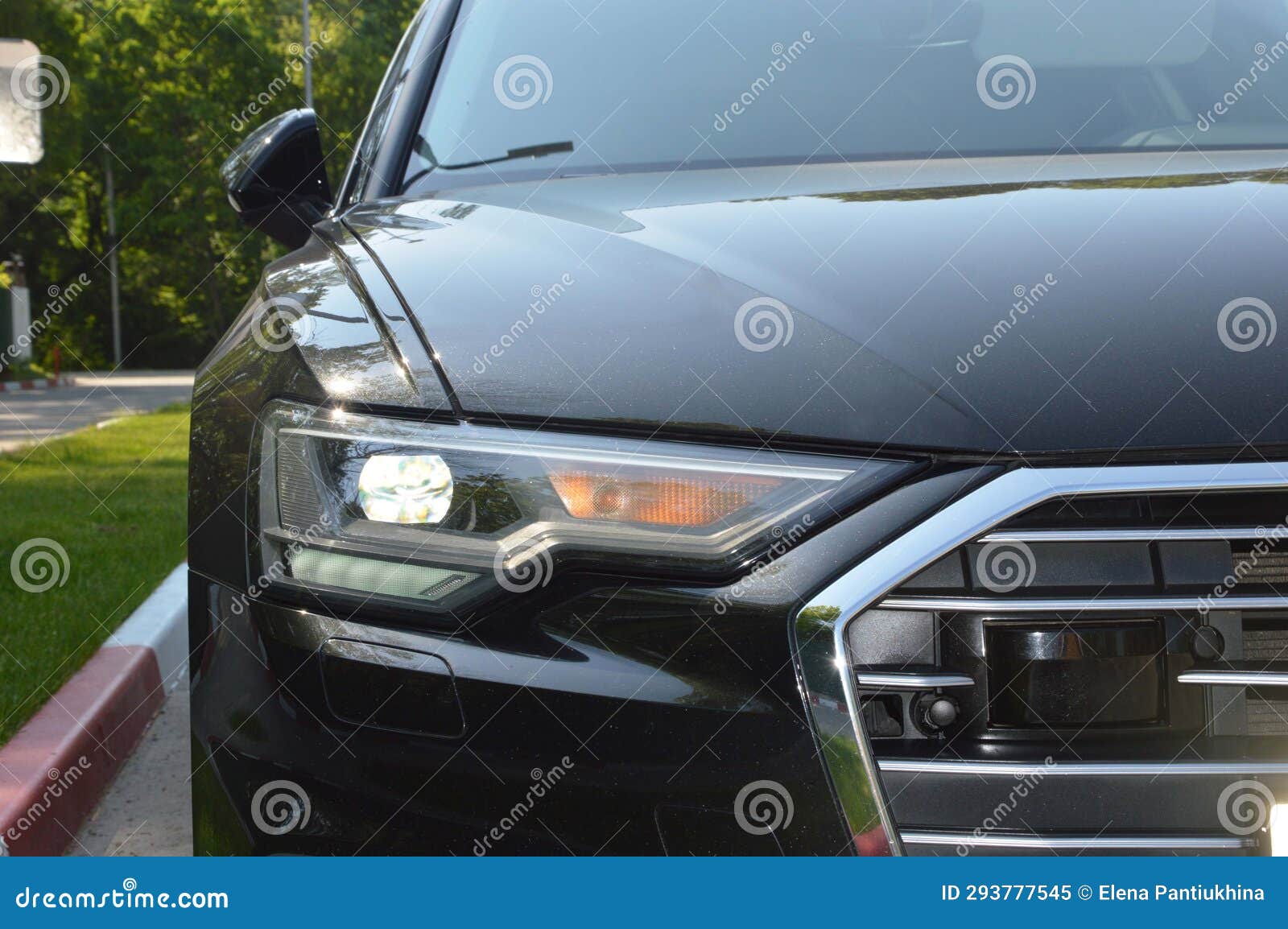 LED Headlight of a Black Passenger Car. Front View. Element of a Modern ...