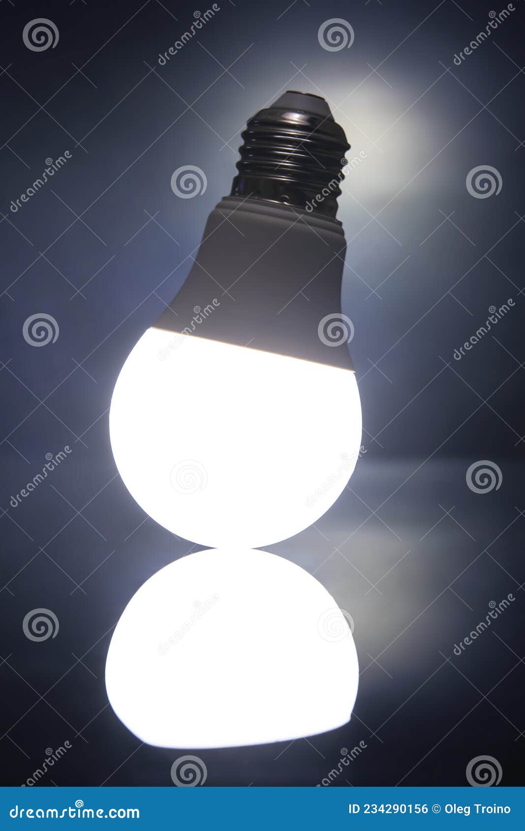 LED Lamp is on Against a Dark Background with Surface Reflection ...