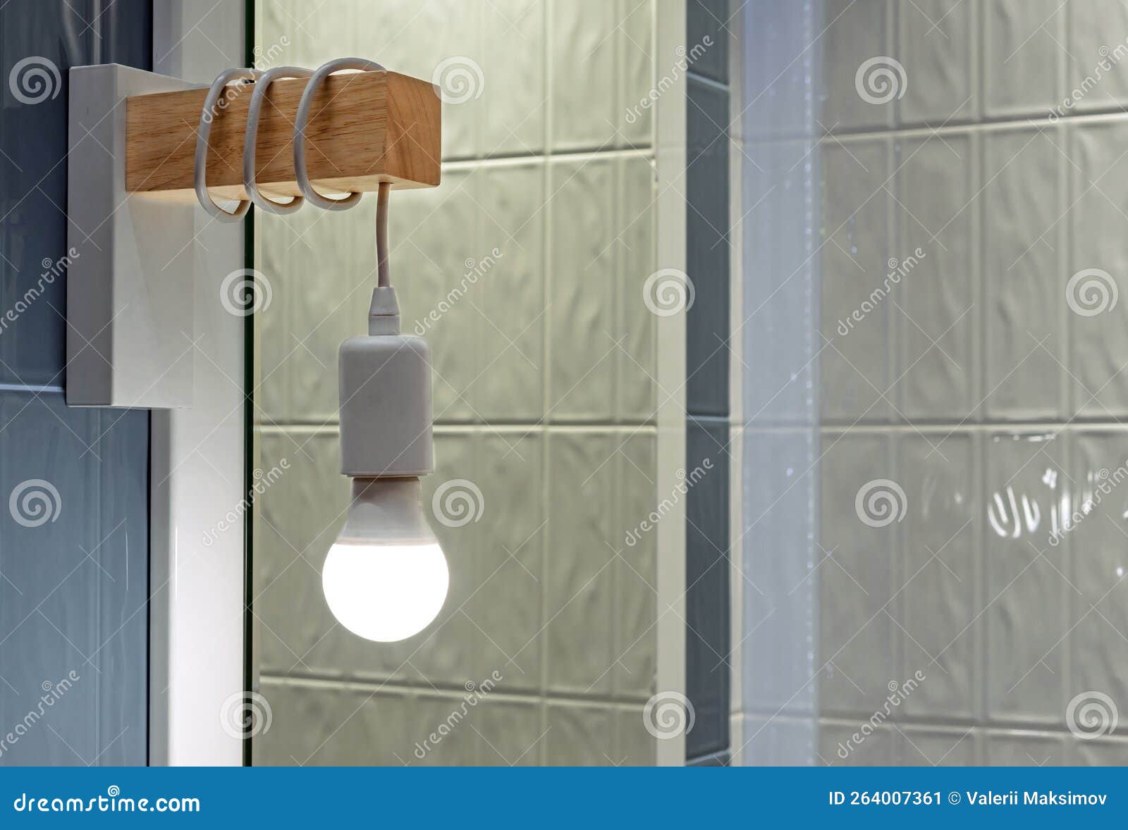 LED Lamp with Coiled Cable in the Interior of the Bathroom. Stock Image ...