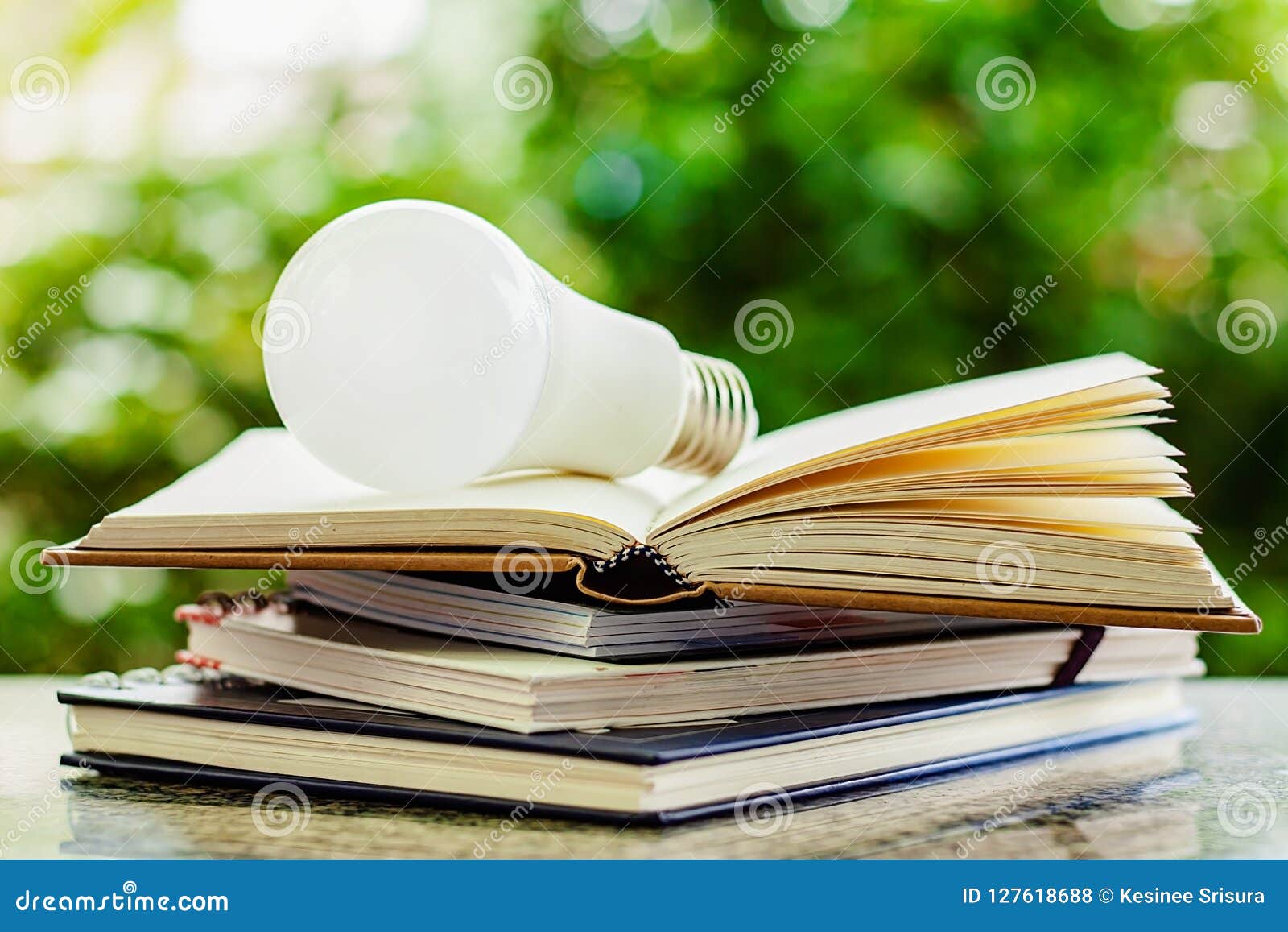 LED Lamp on Stack of Opened Books Stock Photo - Image of data, learn ...