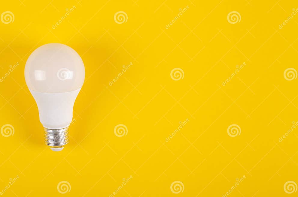 LED Light Bulb Composition on Yellow Background Stock Image - Image of ...