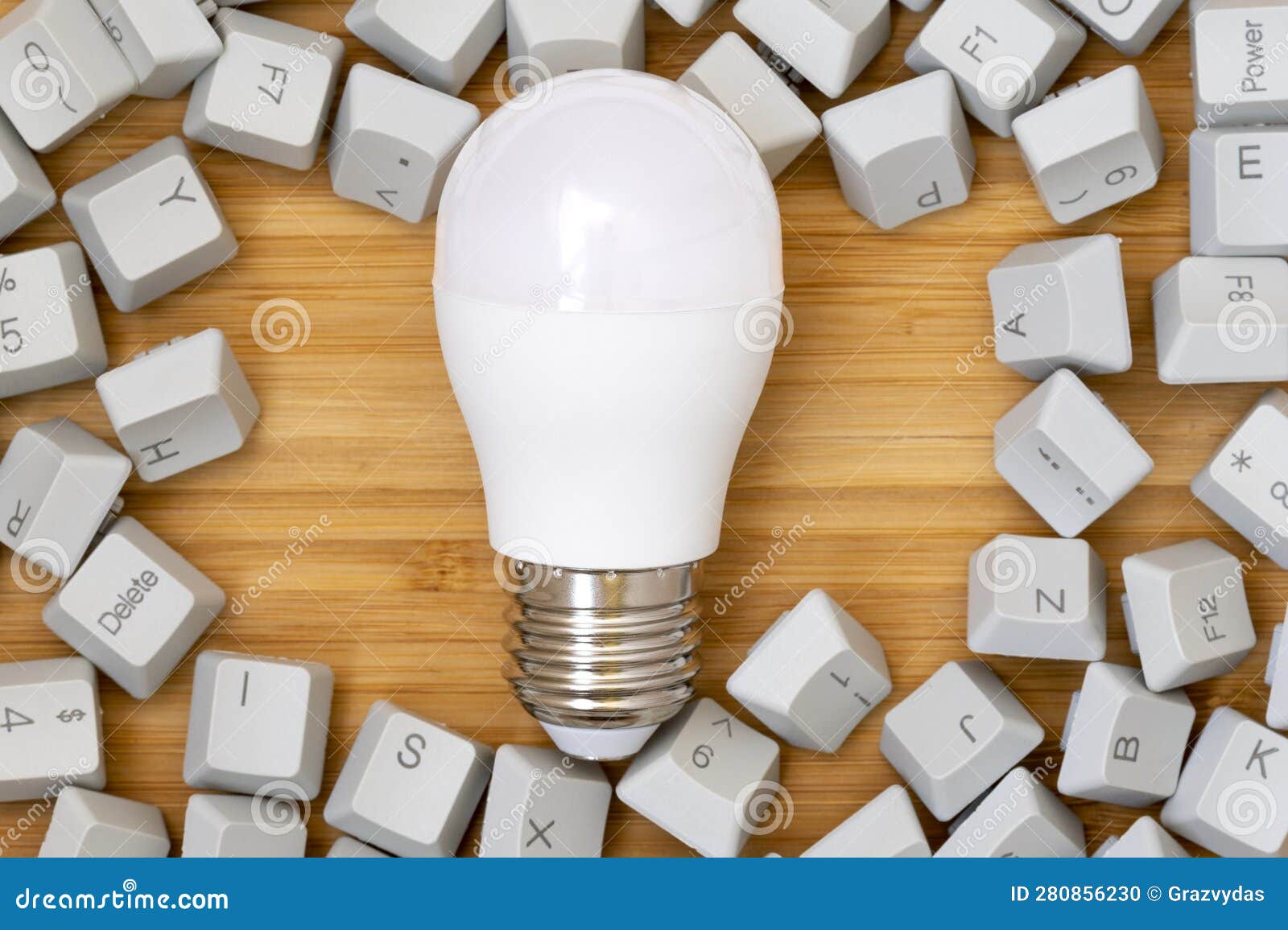 LED Light Bulb among Computer Keyboard Keys Stock Photo - Image of ...