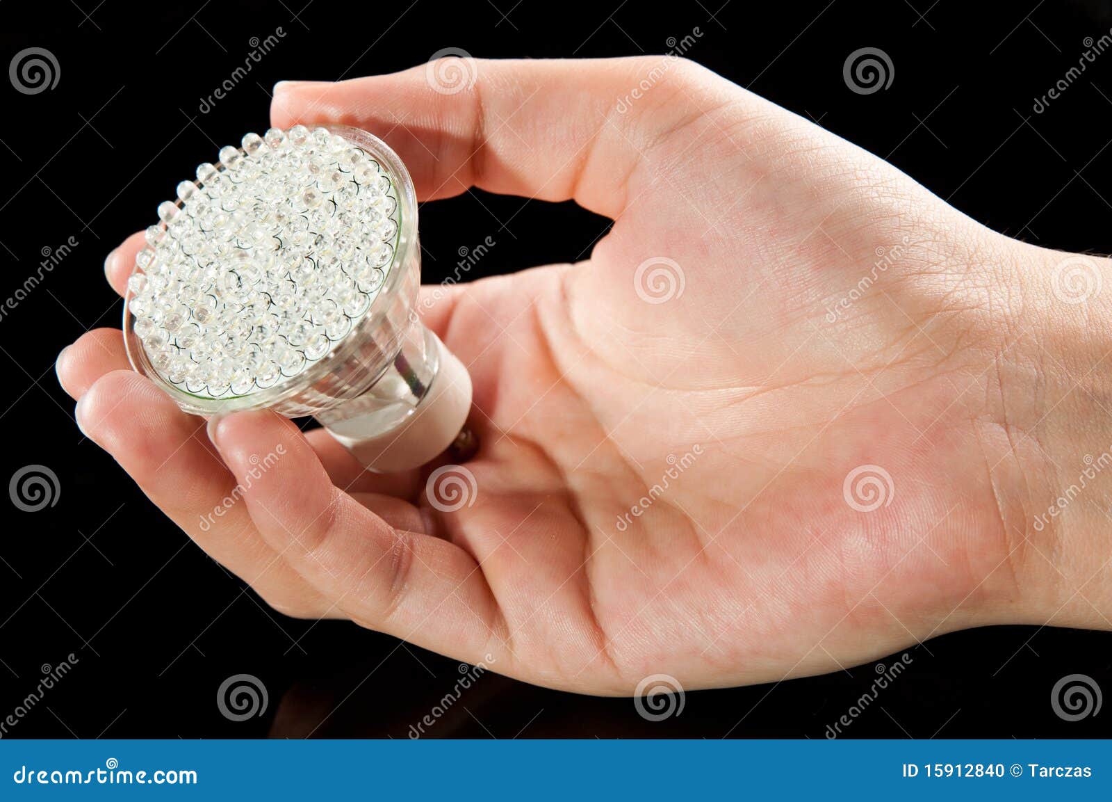 Led light bulb in hand stock photo. Image of illuminate - 15912840